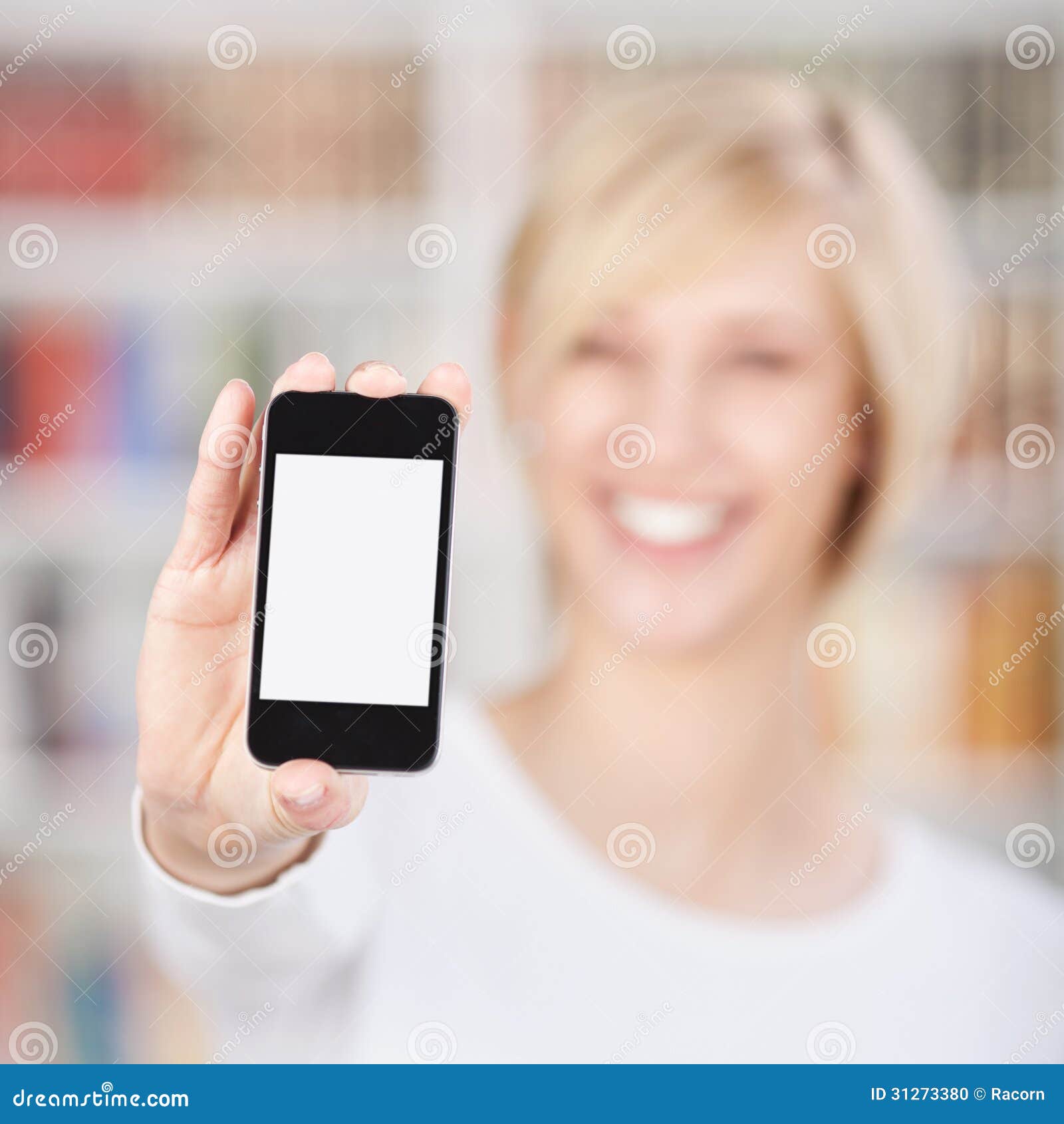 Woman Displaying Mobile Phone in Library Stock Photo - Image of ...