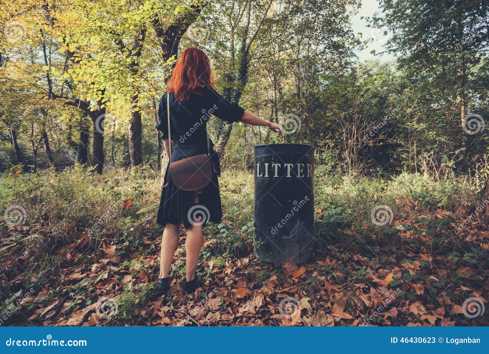 Woman Disposing Litter in the Forest Stock Image - Image of waste ...