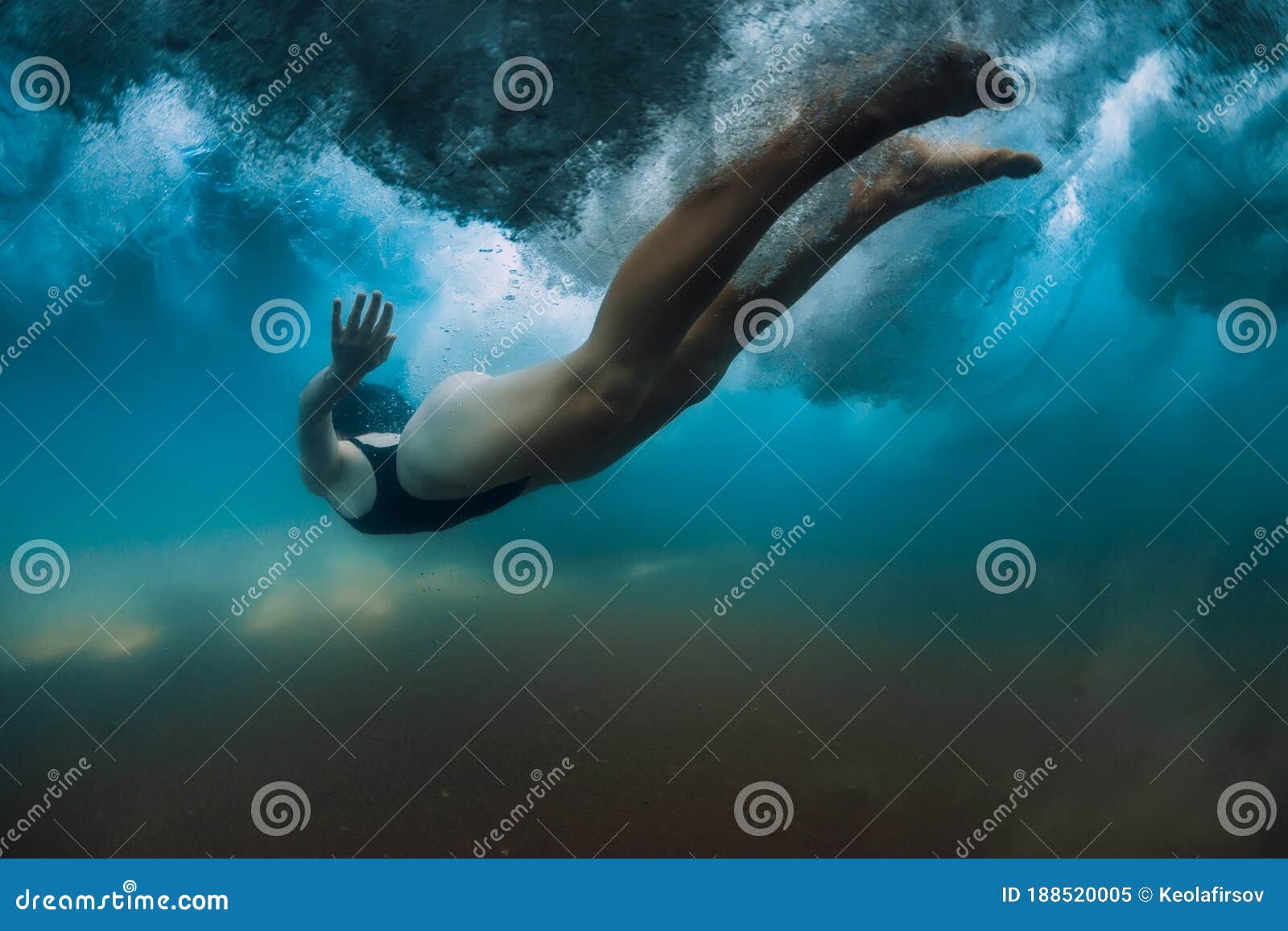 Woman Dive without Surfboard Under Wave. Underwater Duck Dive Under ...