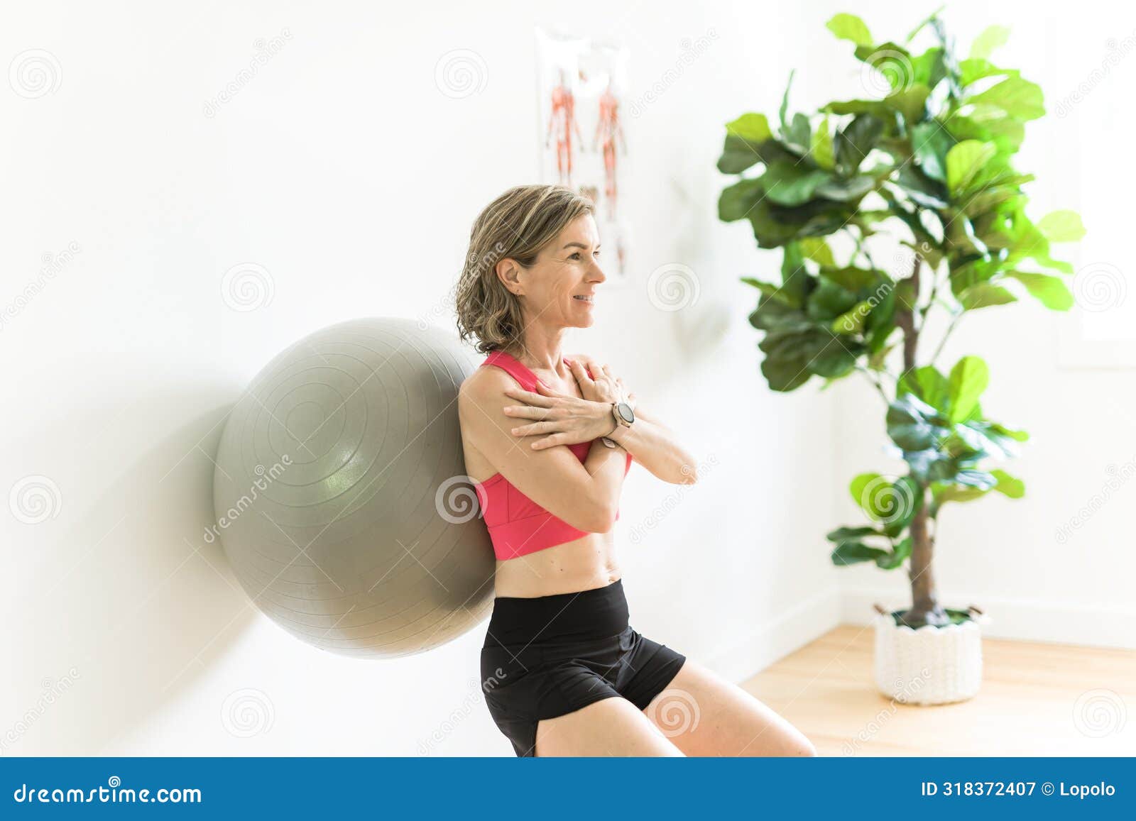 Woman Do Wall Squats with Fit Ball Stock Image - Image of center ...