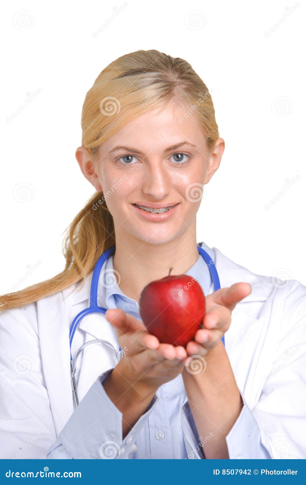 Woman Doctor Holding an Apple Stock Photo - Image of healthy, human ...