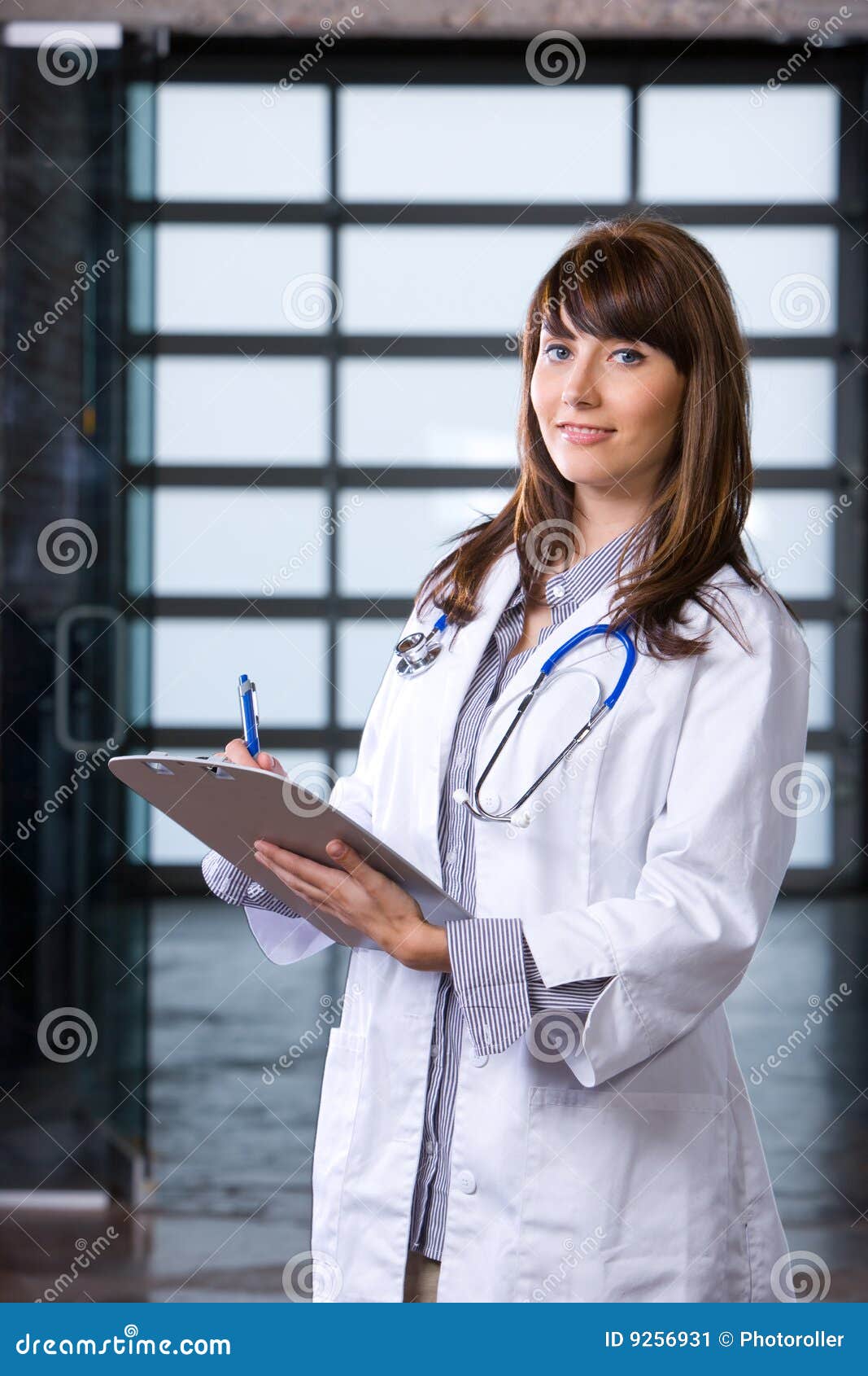 Woman Doctor Holding a Chart Stock Image - Image of board, intern: 9256931