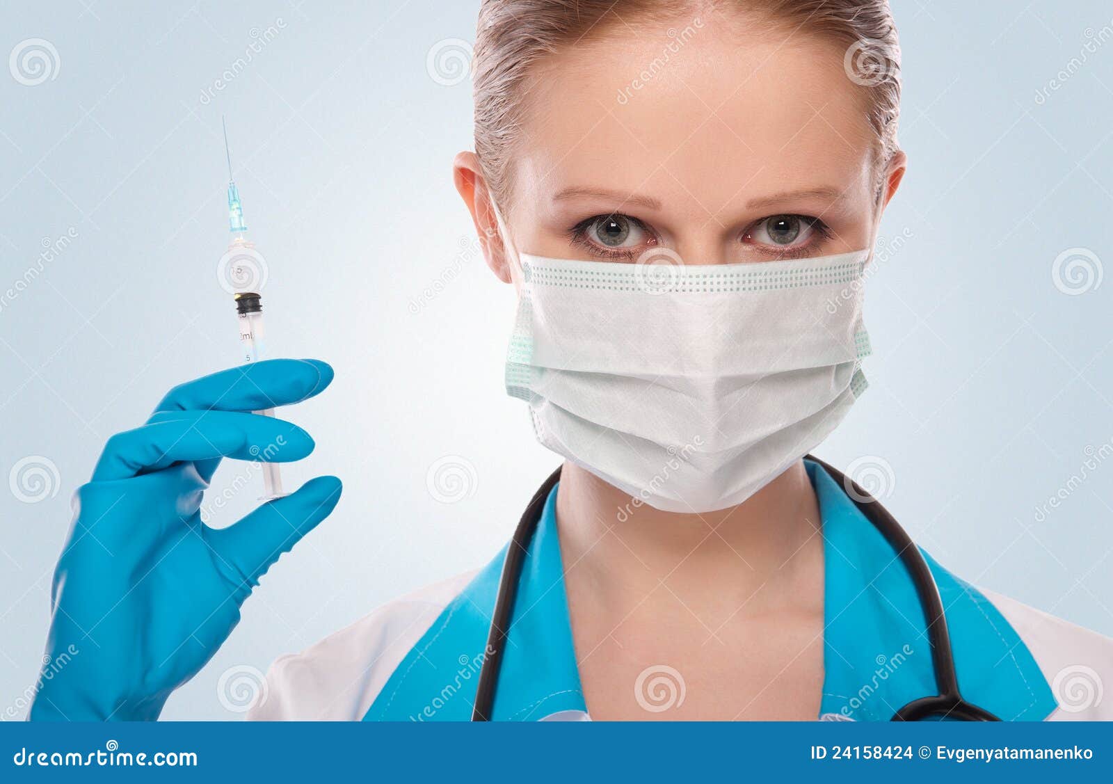 Woman Doctor in a Mask with a Syringe Stock Photo - Image of doctor ...