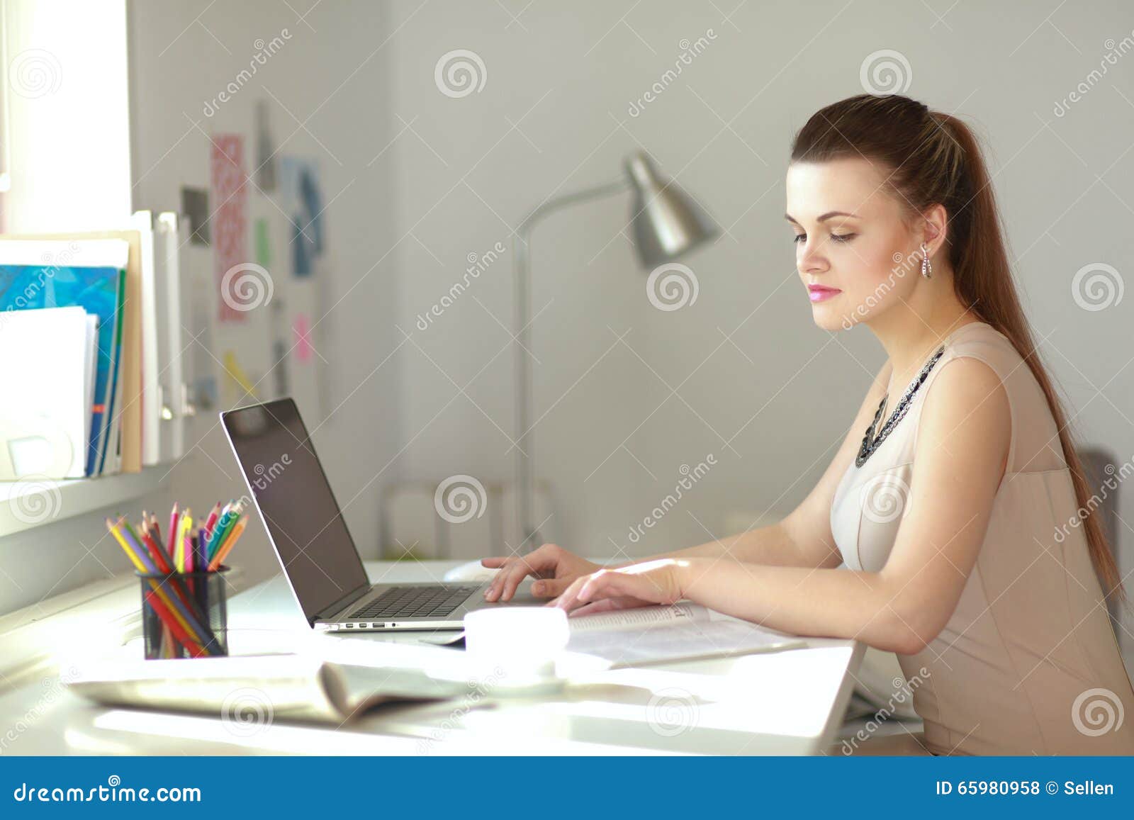 Woman with Documents Sitting on the Desk and Laptop Stock Photo - Image ...