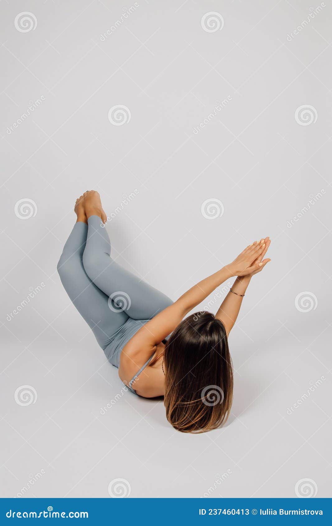Woman Does Sports Beautiful Brunette Is Doing Exercise From Yoga Or