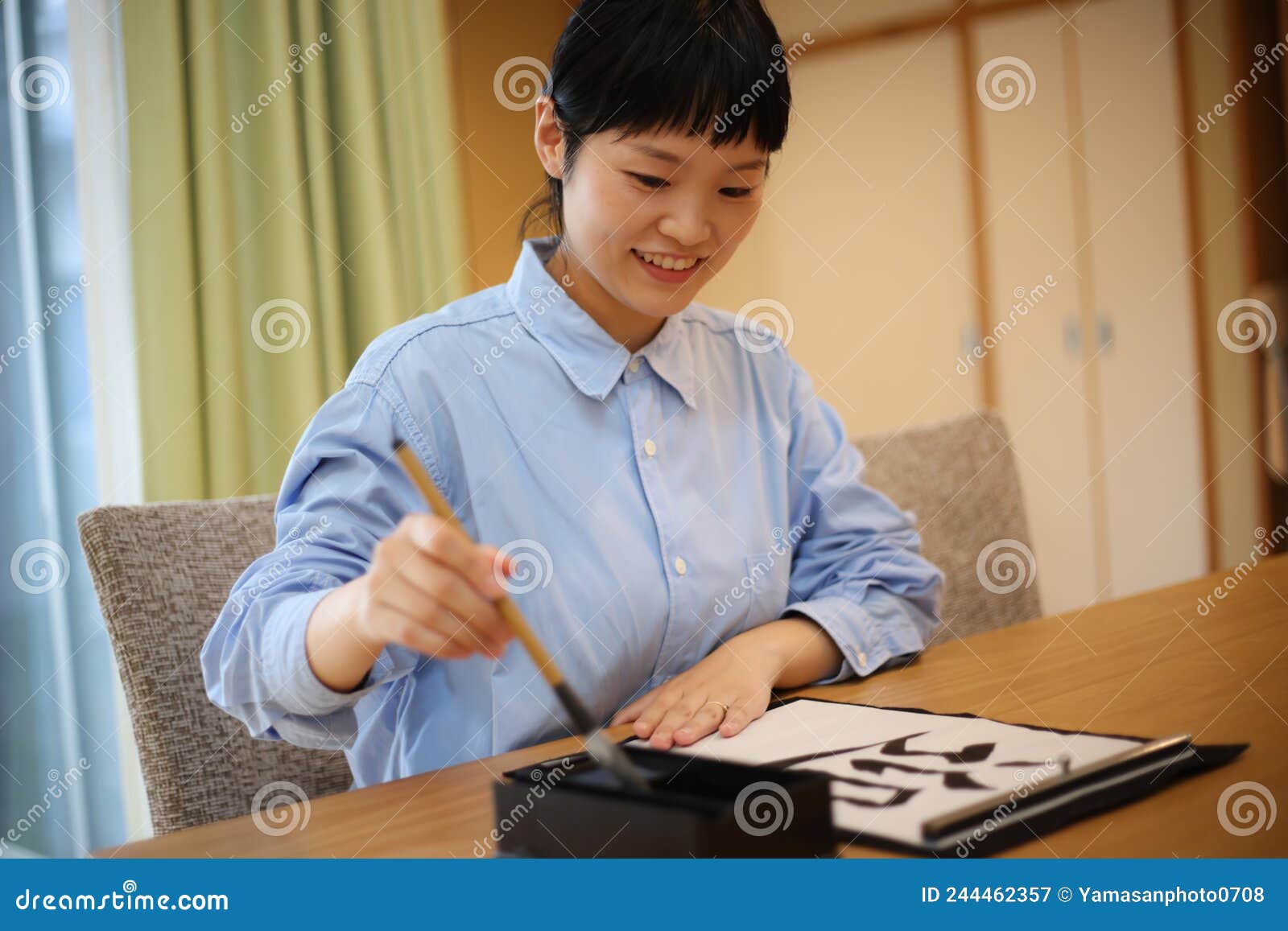 Woman doing calligraphy stock image. Image of asia, japan - 244462357