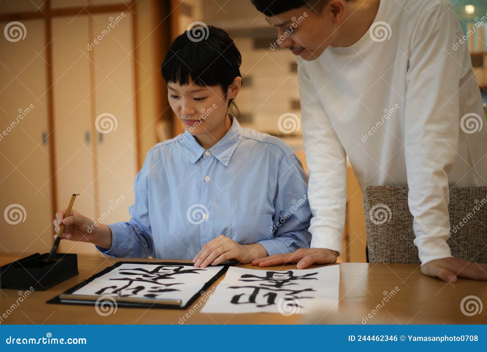 Woman doing calligraphy stock photo. Image of male, bright - 244462346
