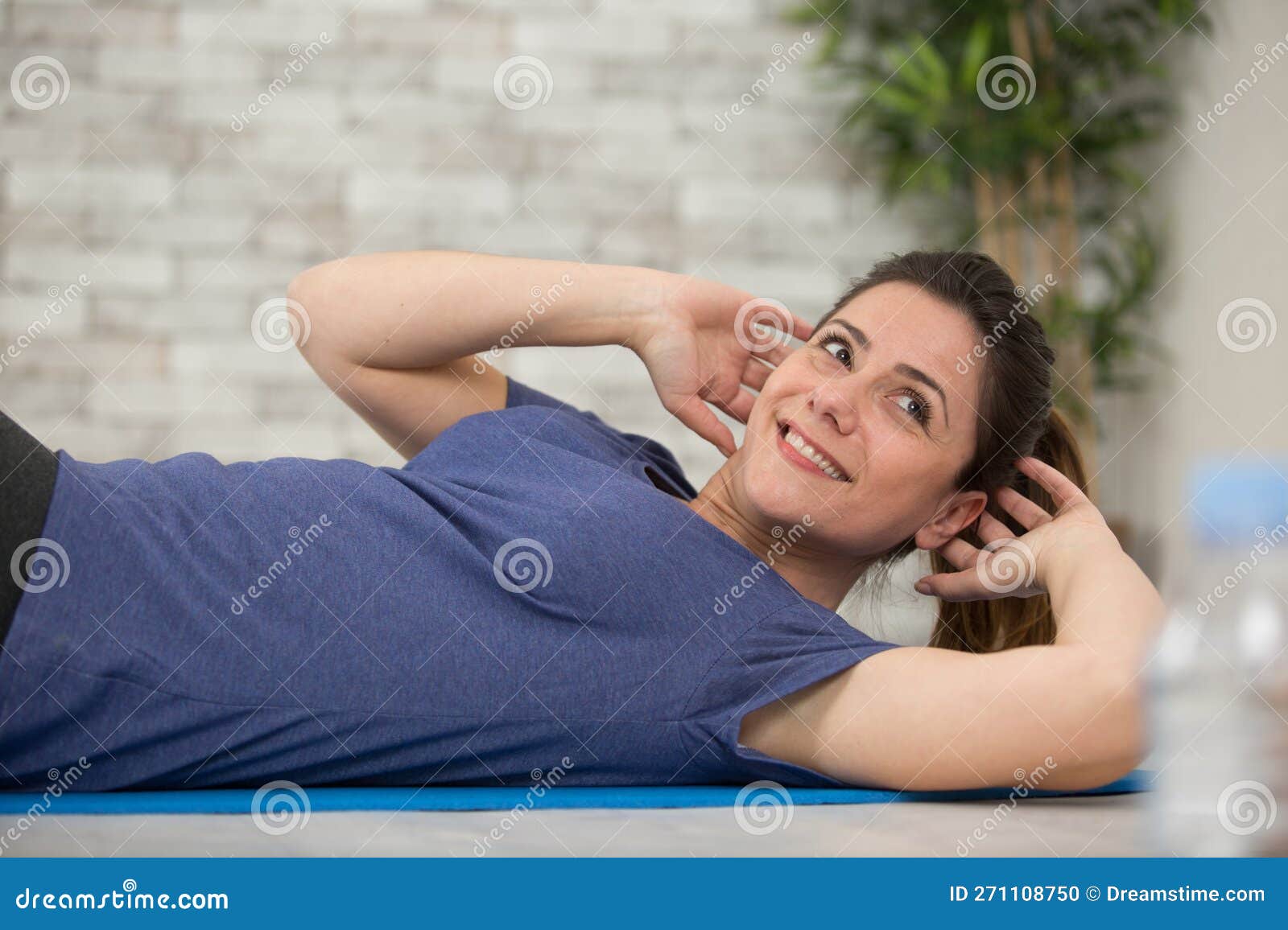 Woman Doing Cross Over Sit Ups Stock Photo - Image of physical, routine ...