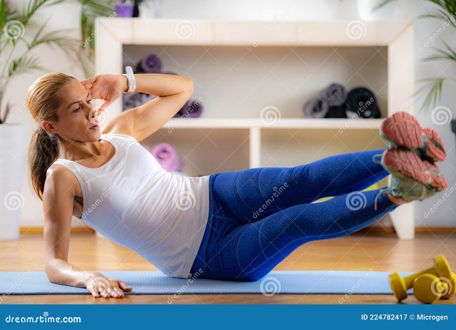 Woman Doing Crunches Indoors Stock Image - Image of sportswear, fitness ...