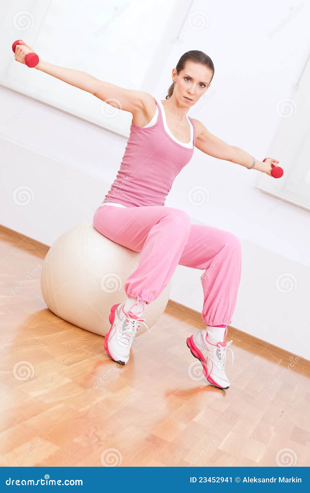Woman Doing Dumbbell Exercise at Sport Gym Stock Image - Image of ...