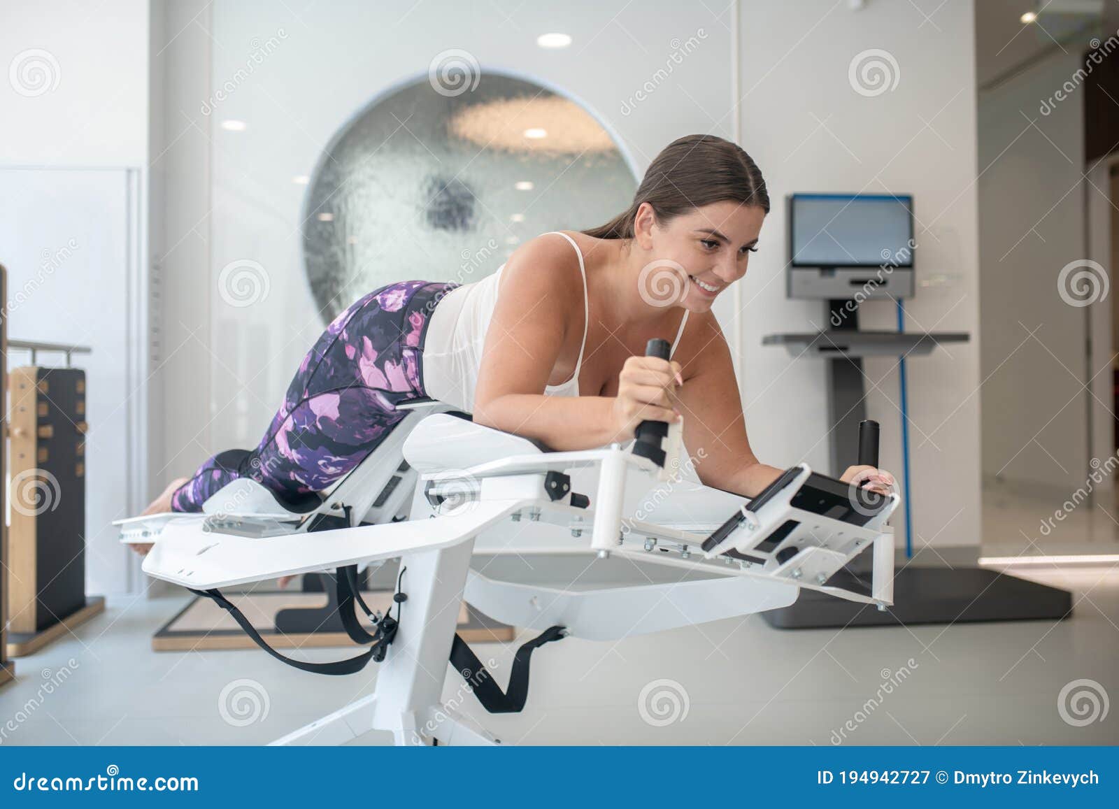 Woman Doing Exercises Using a Gravity Trainer Stock Image - Image of ...