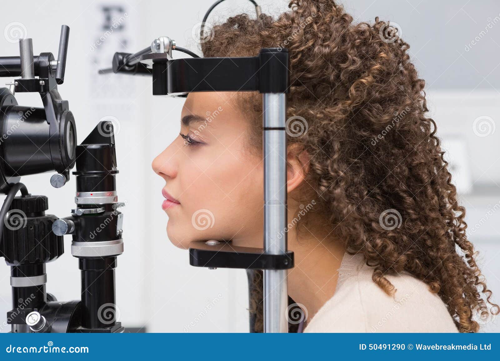 Woman doing eye test stock photo. Image of optometrist - 50491290