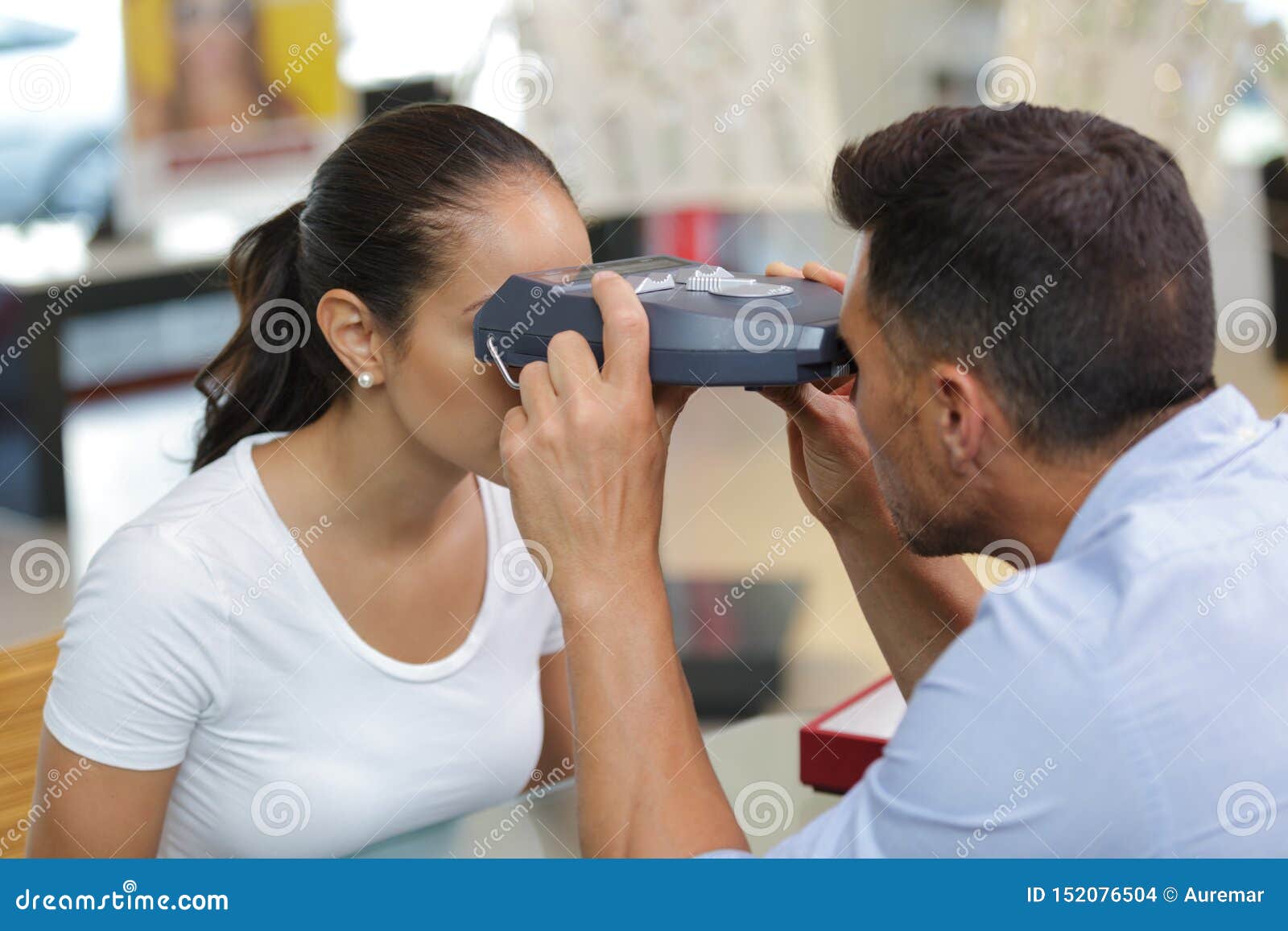 Woman Doing Eye Test with Optometrist in Eye Sight Clinic Stock Photo ...