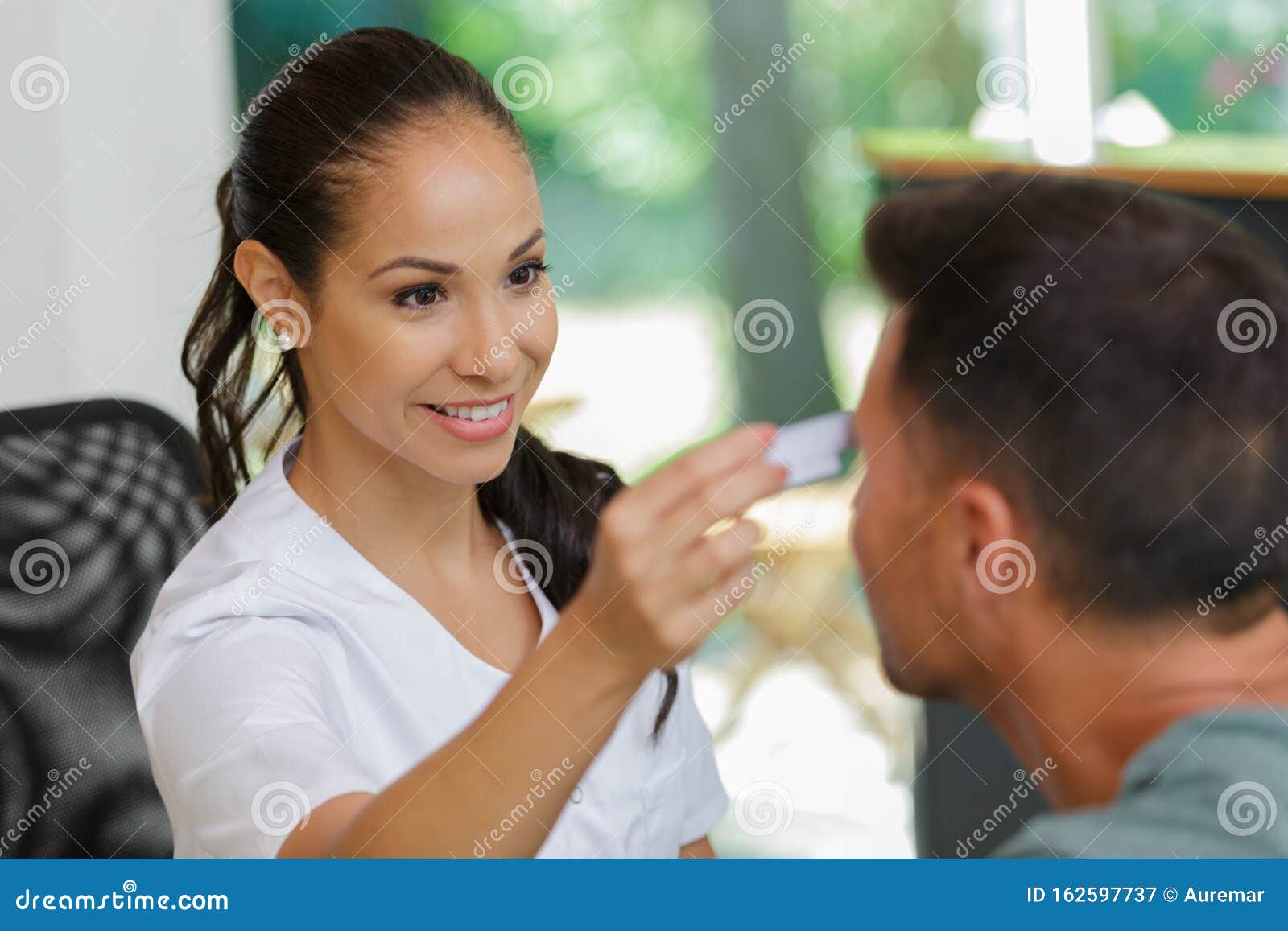 Woman Doing Eye Test with Optometrist in Eye Sight Clinic Stock Image ...