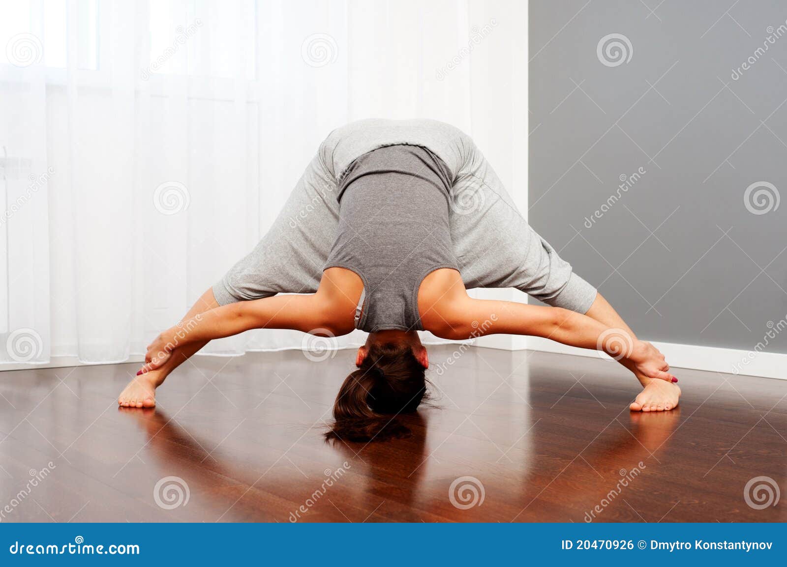 Woman Doing Flexibility Exercise in Room Stock Photo - Image of model ...