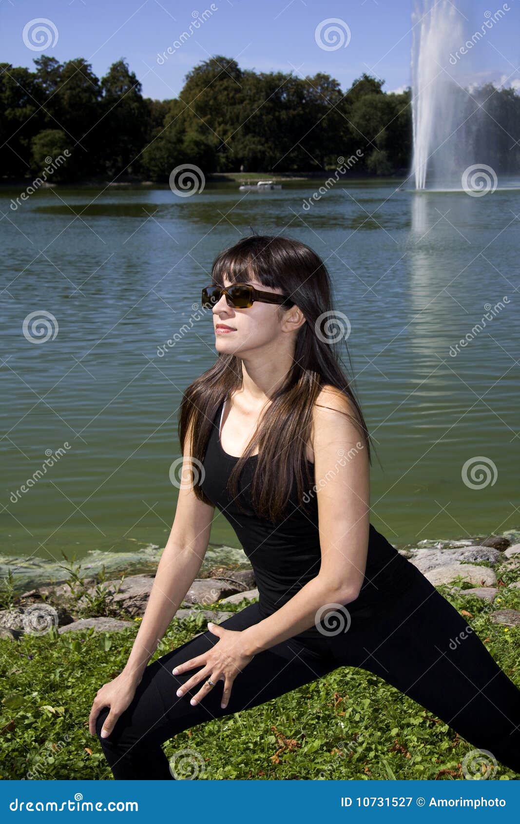 Woman doing a full stretch stock image. Image of grass - 10731527