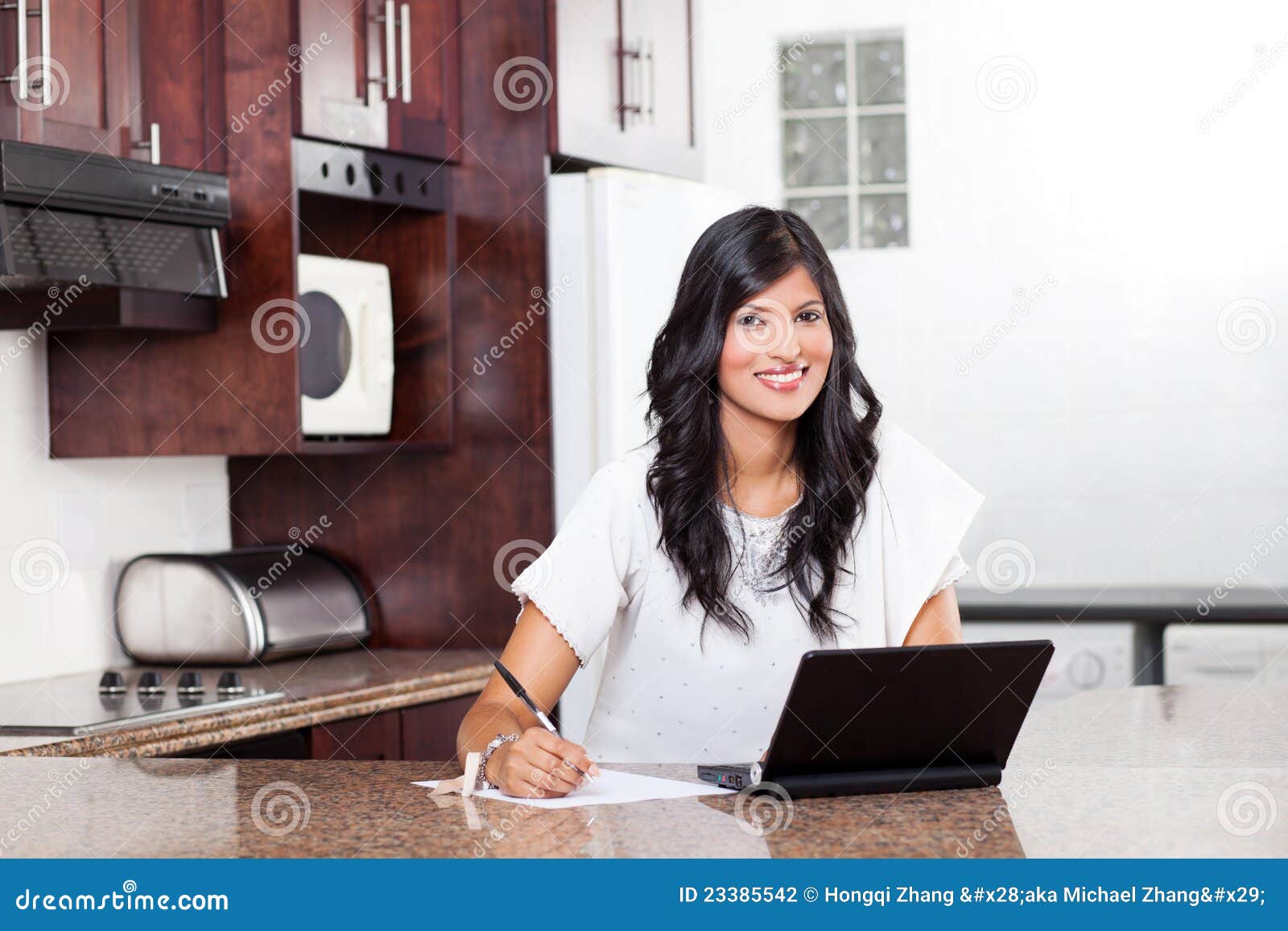 Woman doing home finance stock photo. Image of indian - 23385542