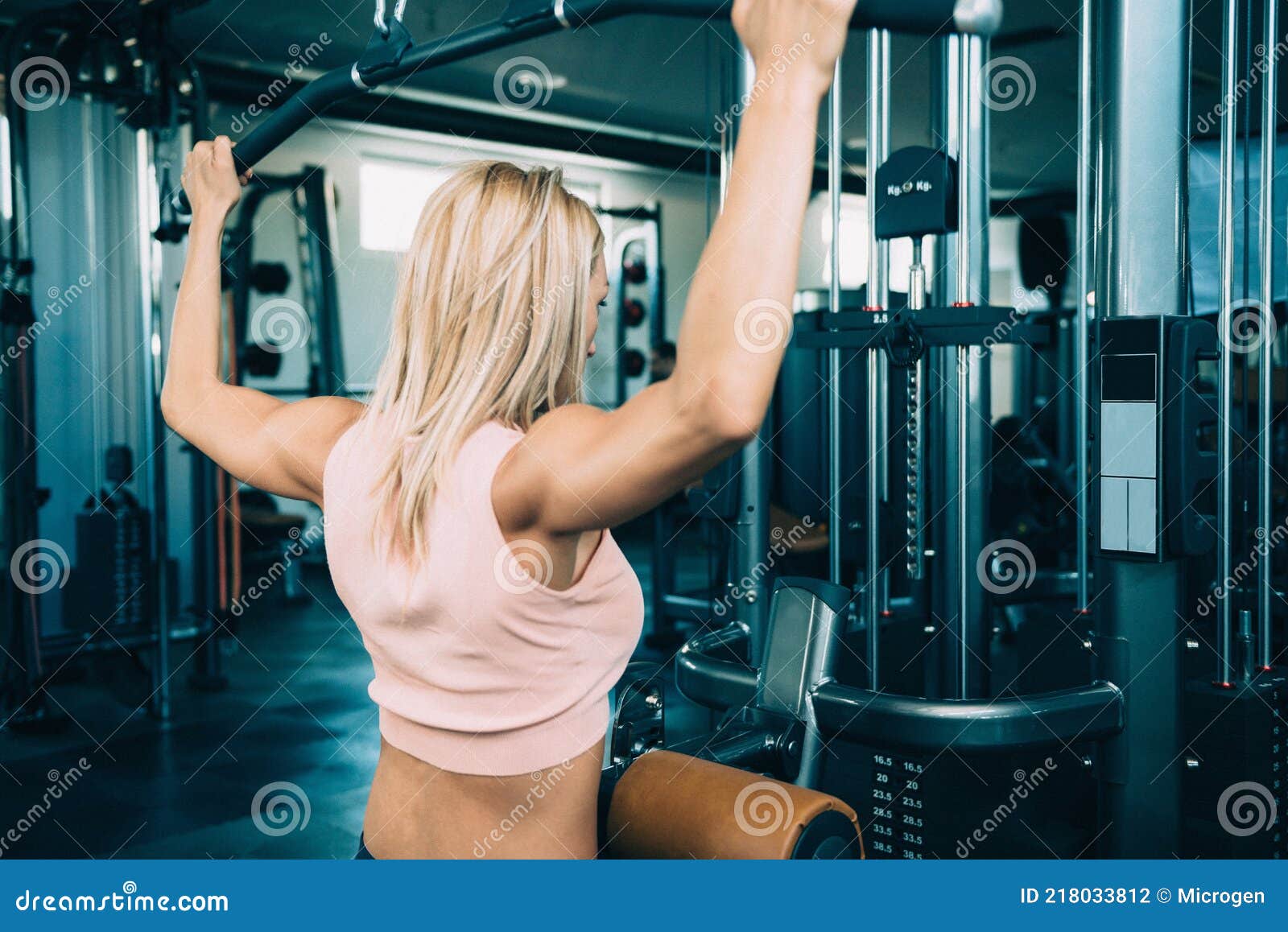 Lats Pull-down Workout in Gym Stock Photo - Image of conscious, people ...