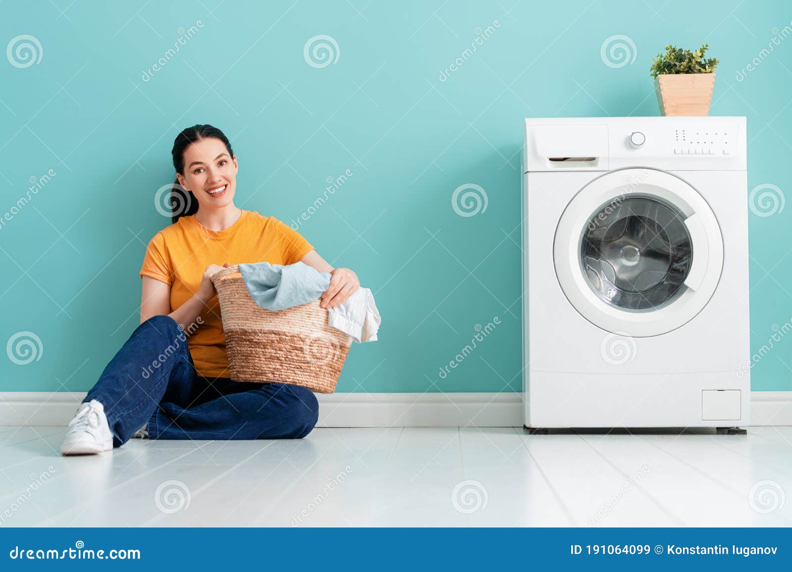 Woman doing laundry stock image. Image of caucasian - 191064099
