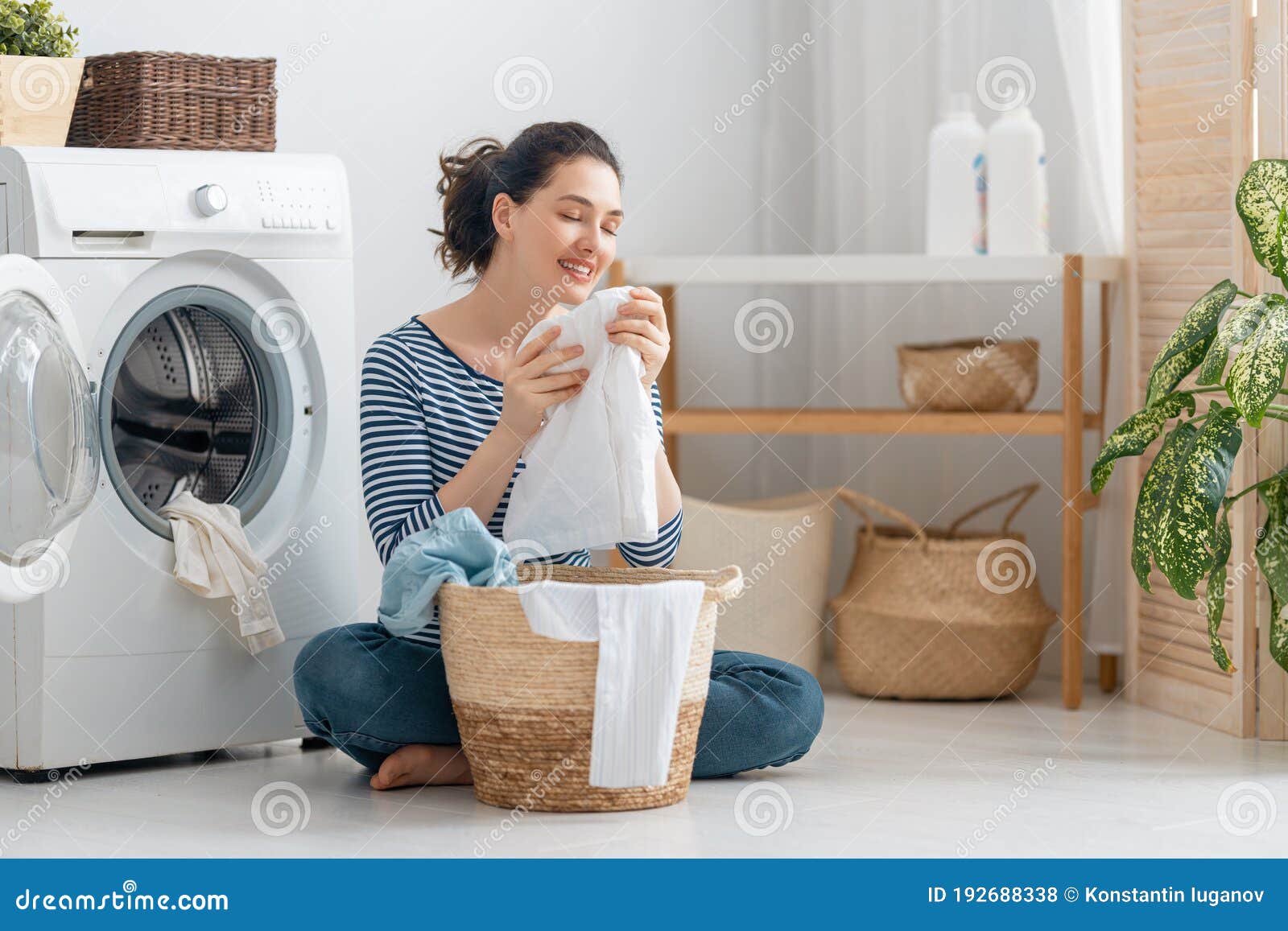 Woman is doing laundry stock photo. Image of home, indoor - 192688338