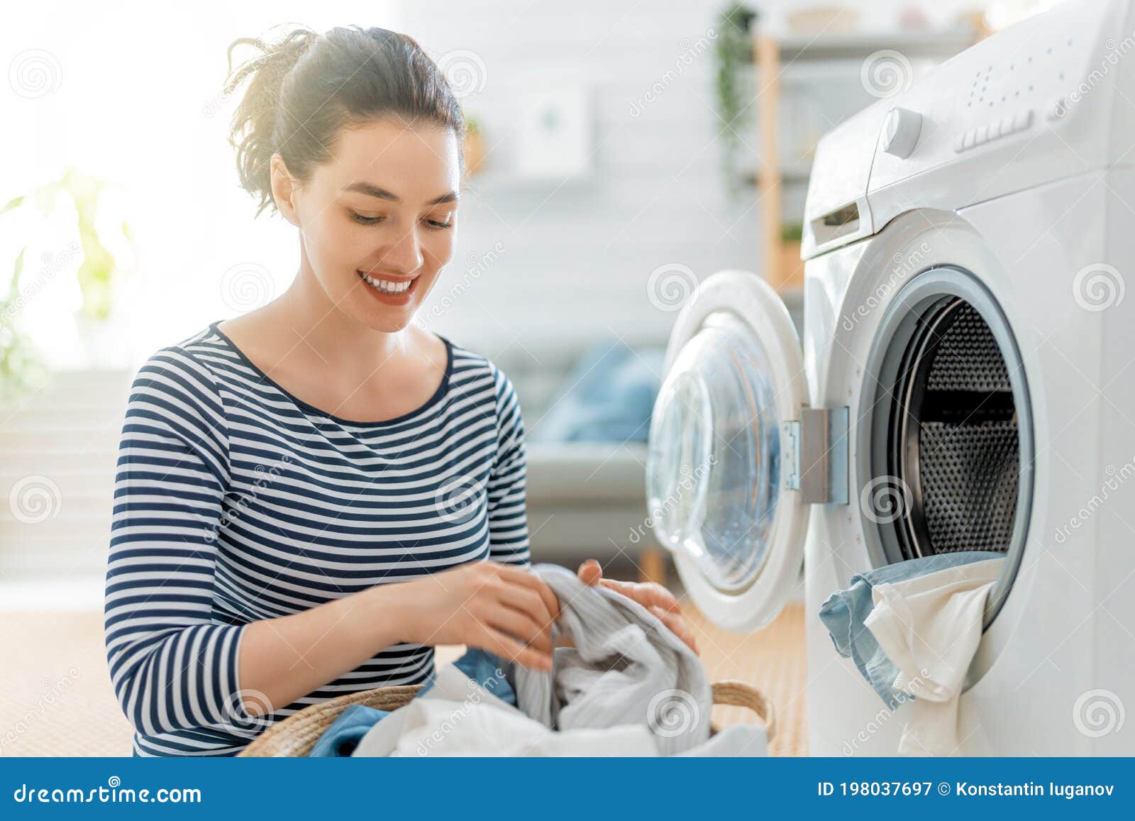 Woman is doing laundry stock image. Image of hygiene - 198037697