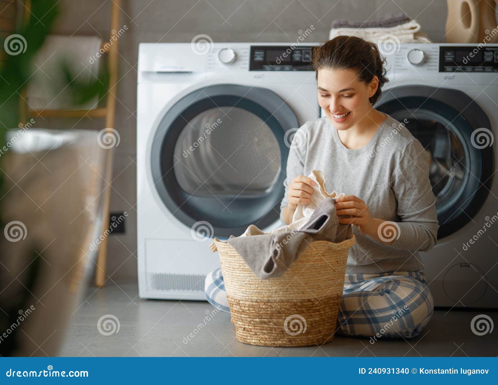 Woman is doing laundry stock photo. Image of house, basket - 240931340