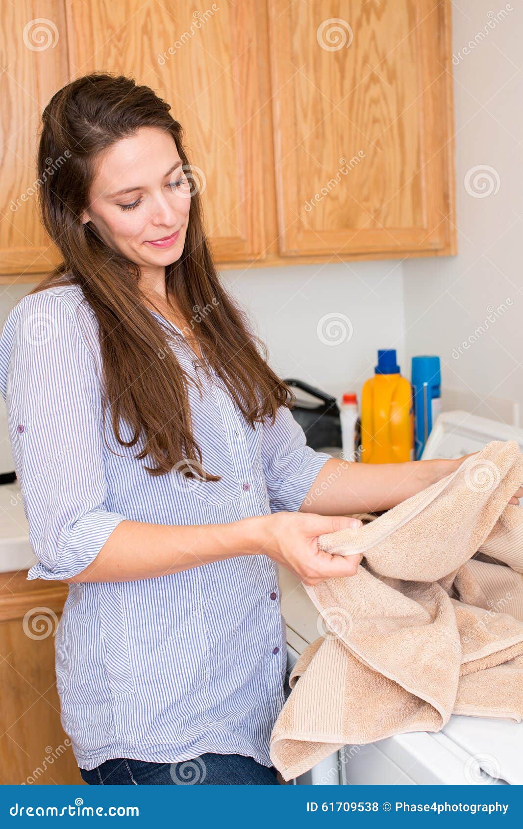 Woman doing laundry stock photo. Image of everyday, dirty - 61709538