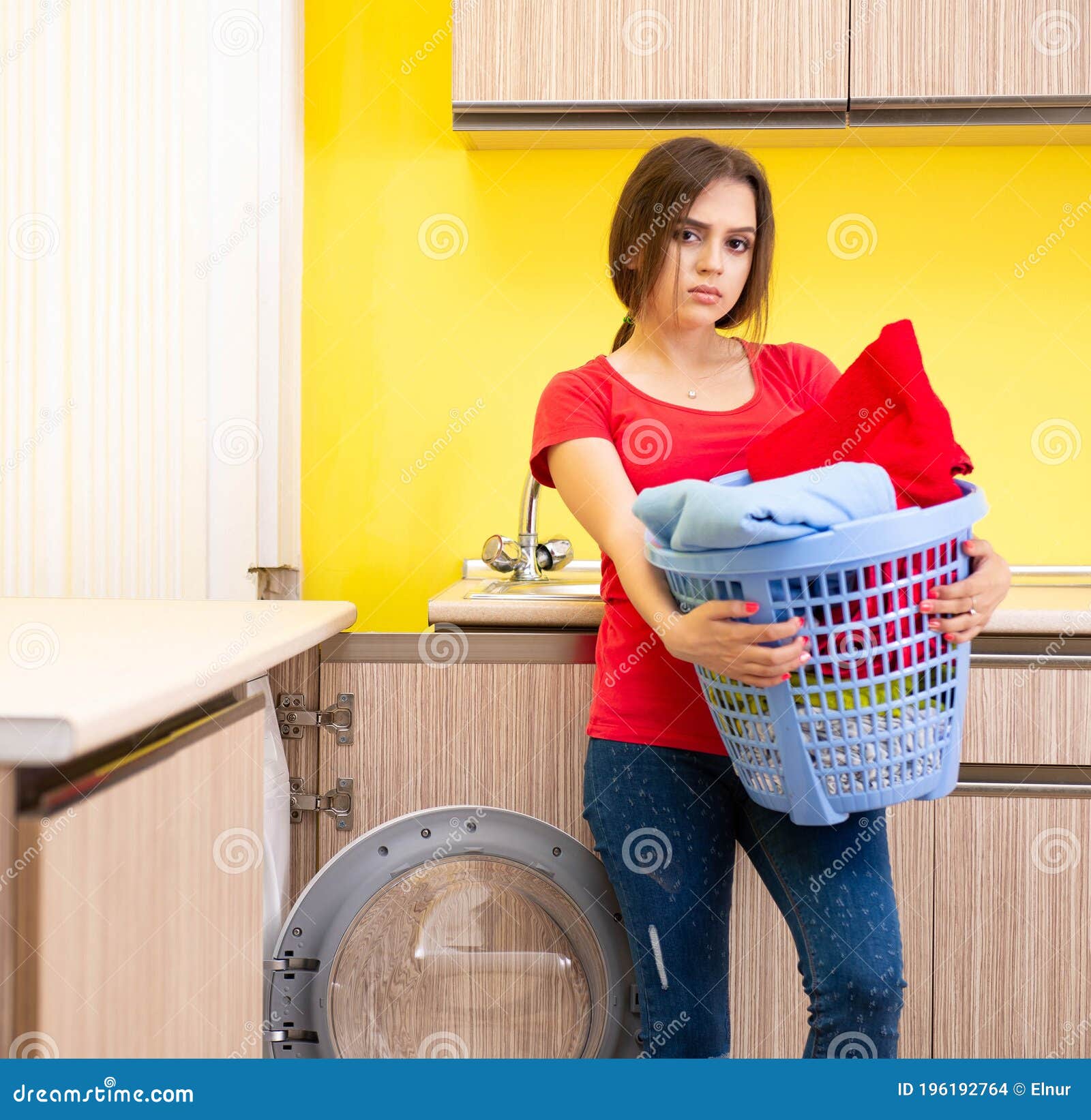 Woman Doing Laundry at Home Stock Photo - Image of dryer, household ...