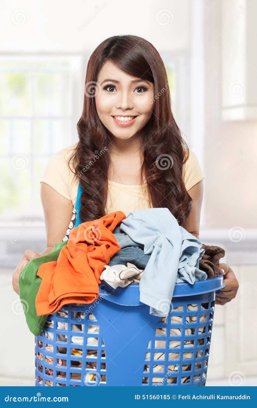 Woman doing laundry stock image. Image of housewife, lifestyle - 51560185