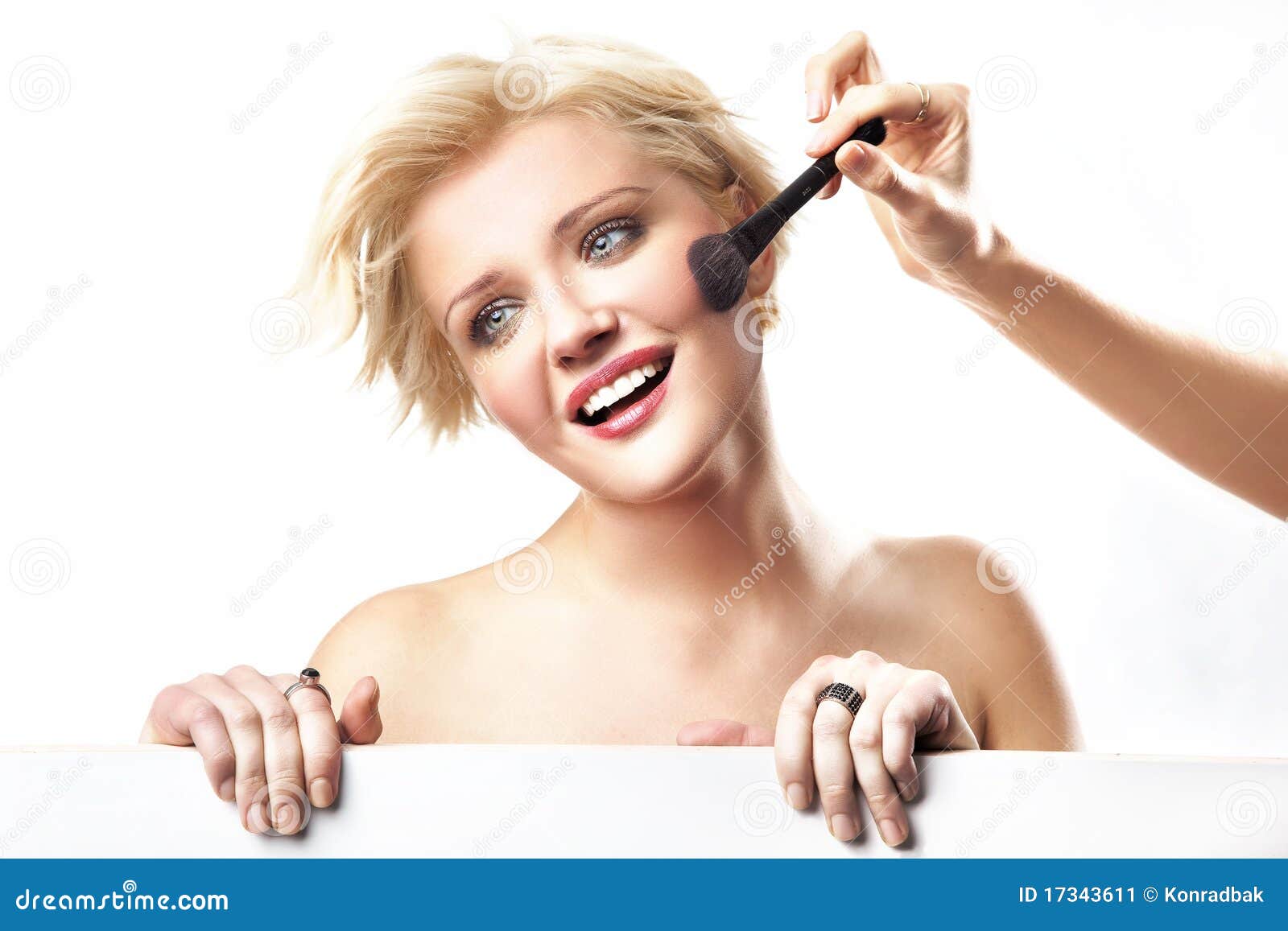 Woman doing make up stock image. Image of beautiful, isolated - 17343611