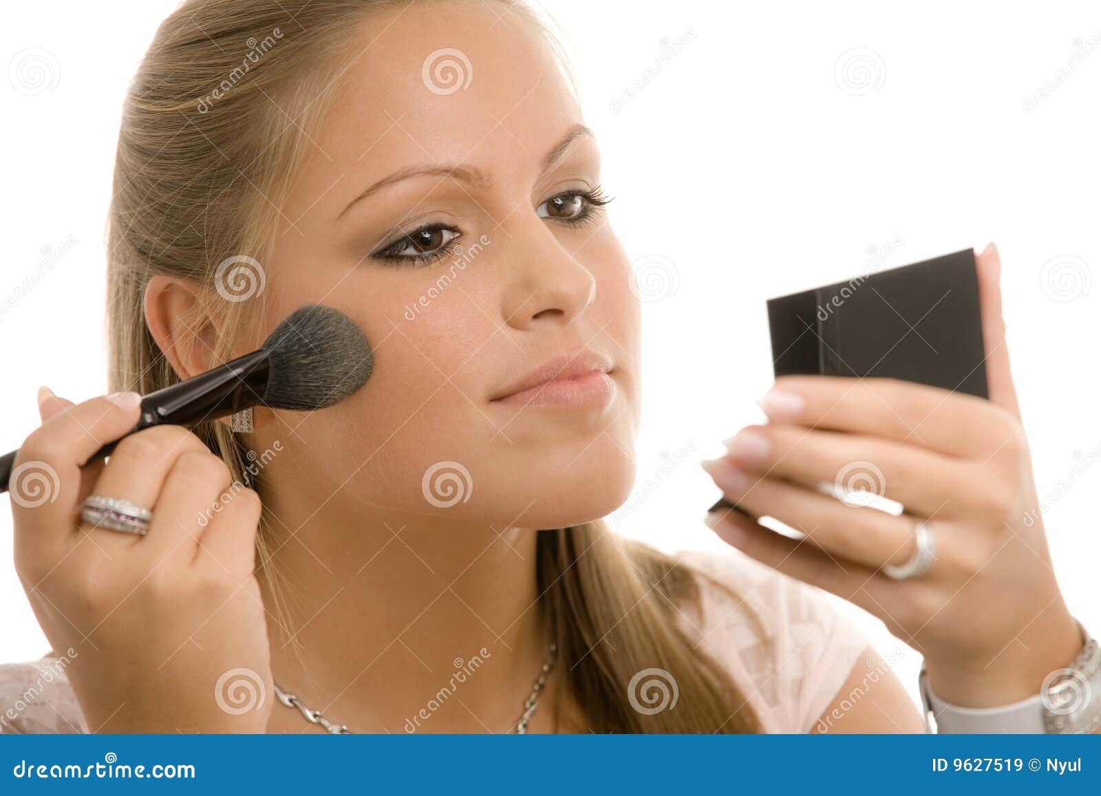 Woman doing makeup stock image. Image of girl, headshot - 9627519