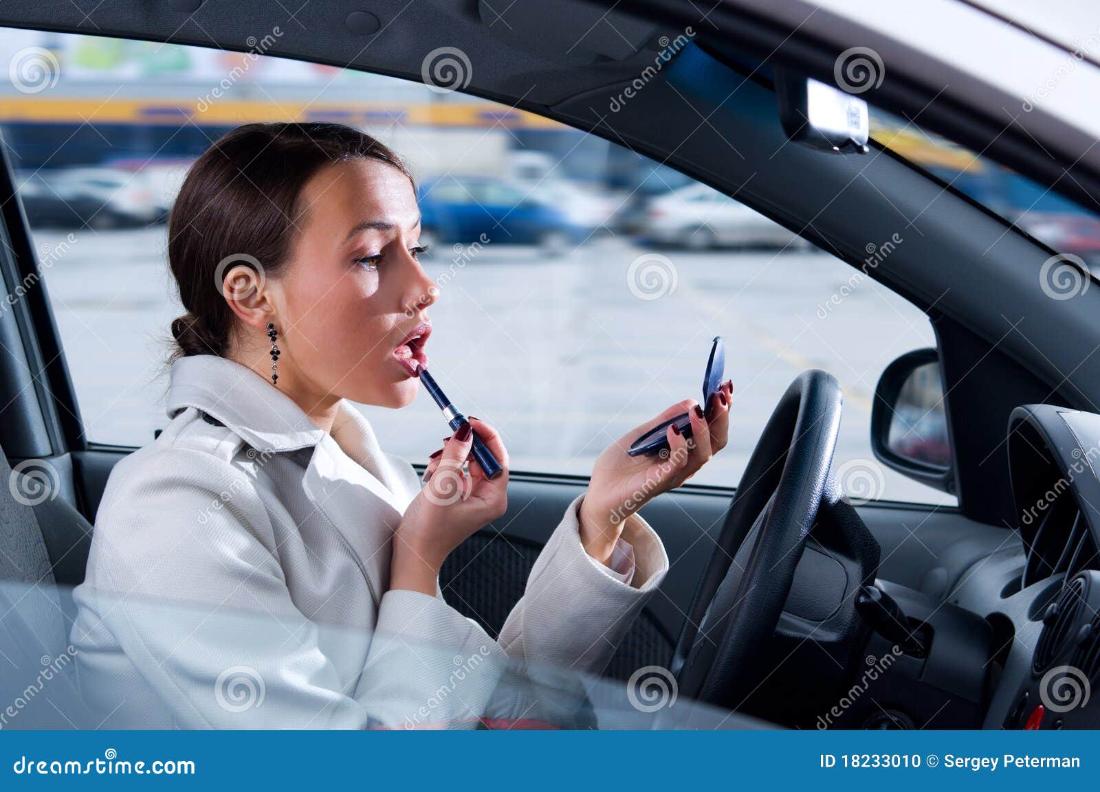Woman is Doing Makeup on the Run in Car Stock Photo - Image of driver ...