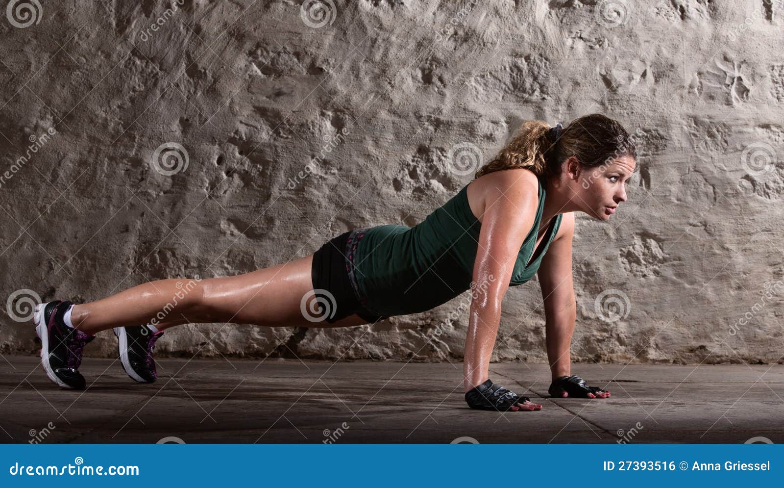 Woman Doing Push-ups Alone stock photo. Image of exercise - 27393516