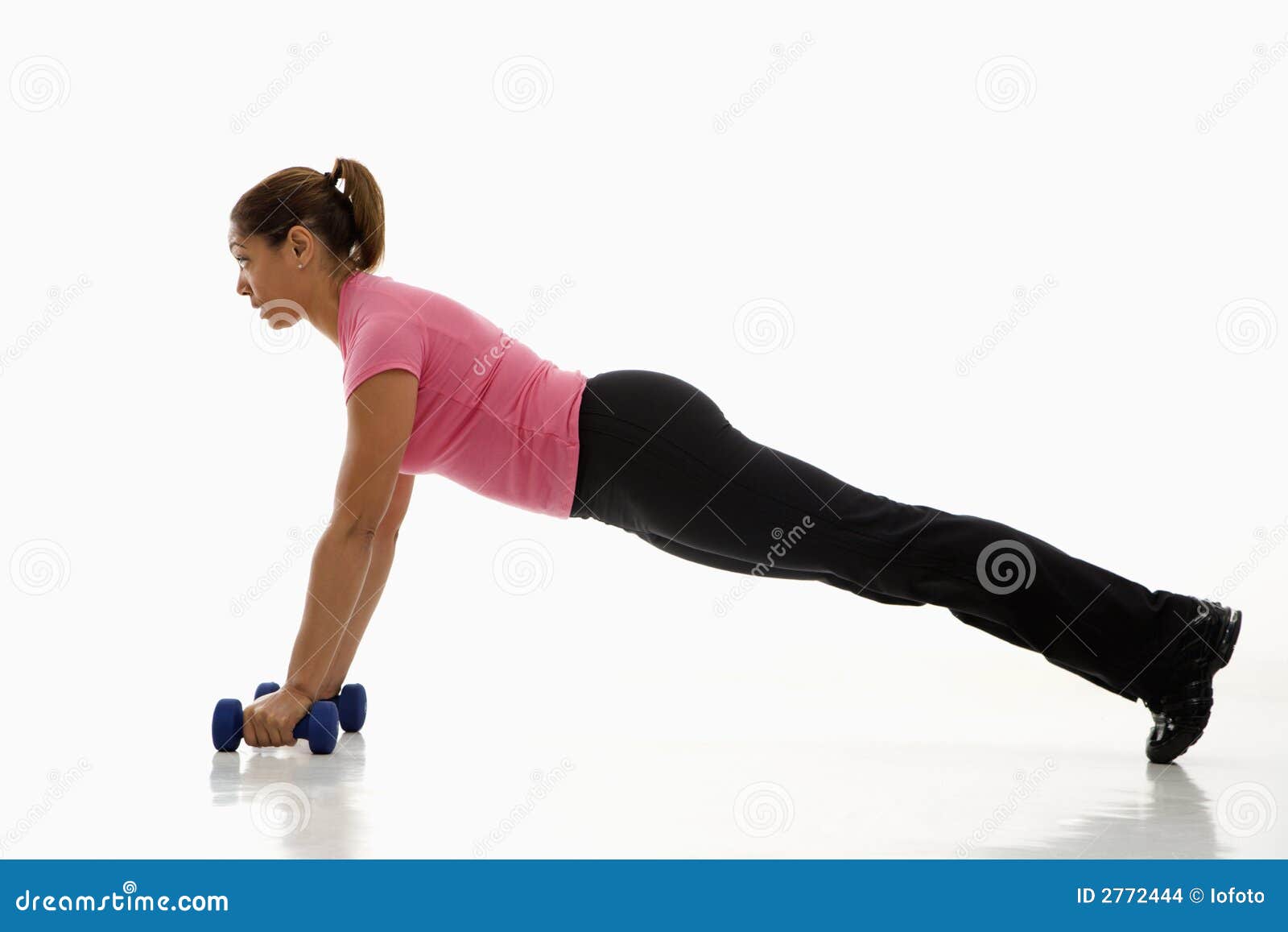 Woman doing pushups. stock photo. Image of indoors, clothing - 2772444