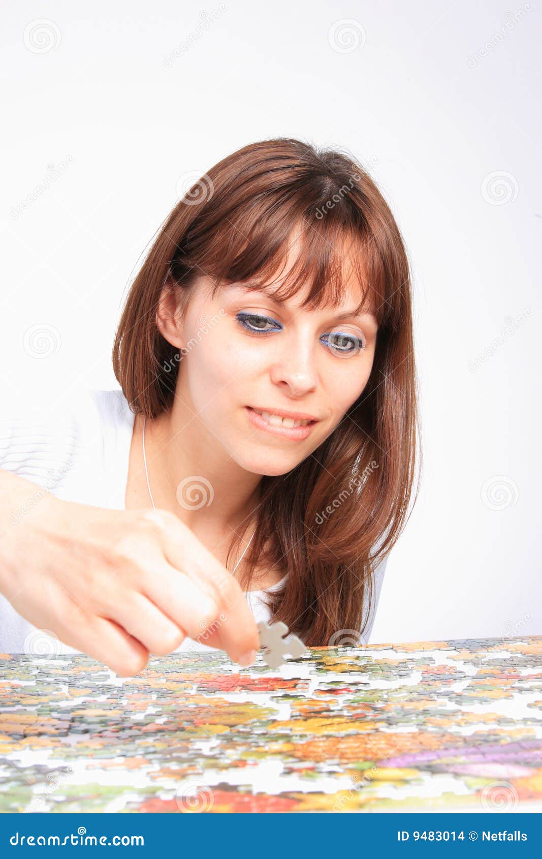 Woman doing puzzle stock photo. Image of game, leisure - 9483014
