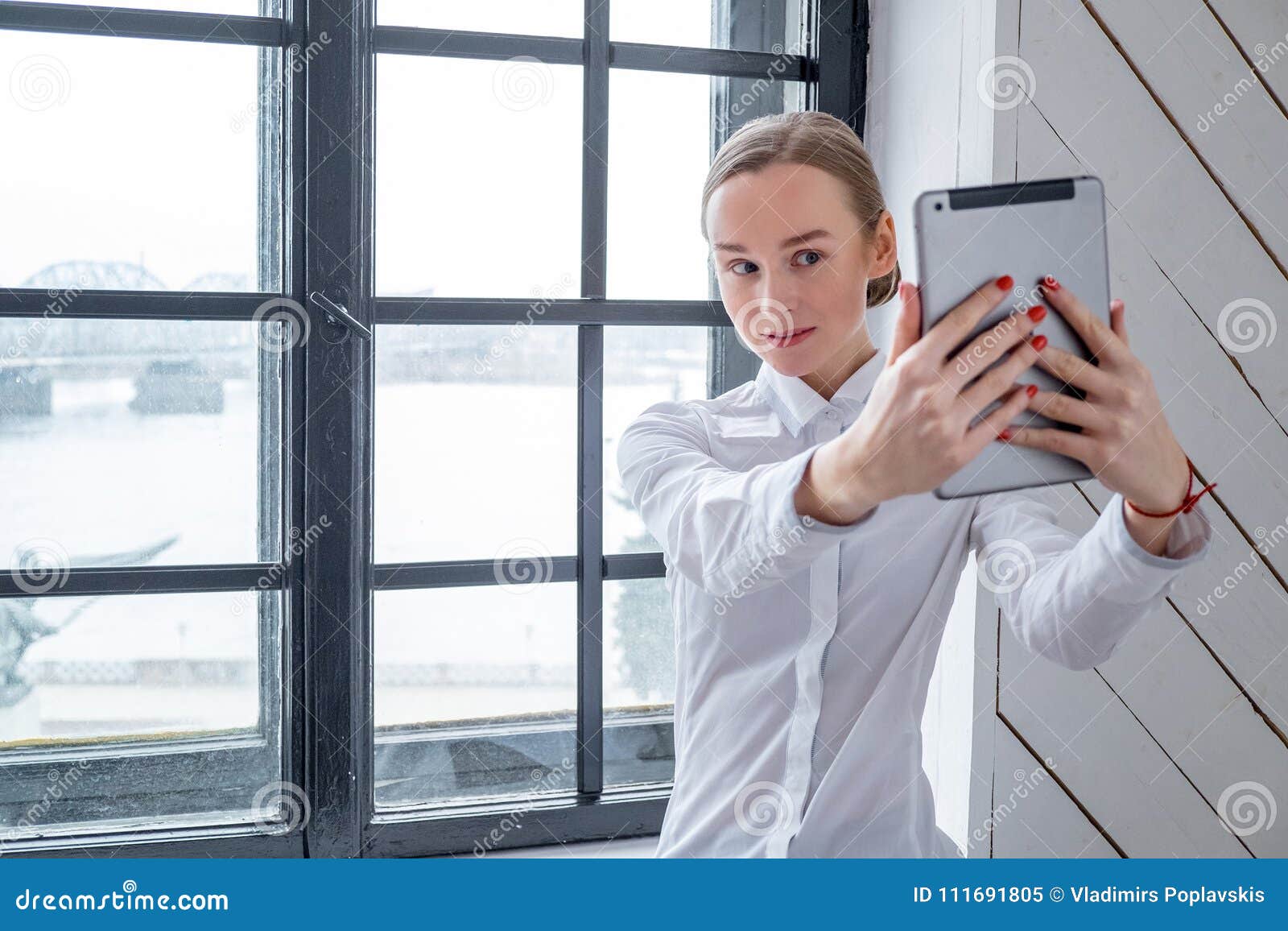 A Woman Doing Selfie on Tablet Computer. Stock Image - Image of ...