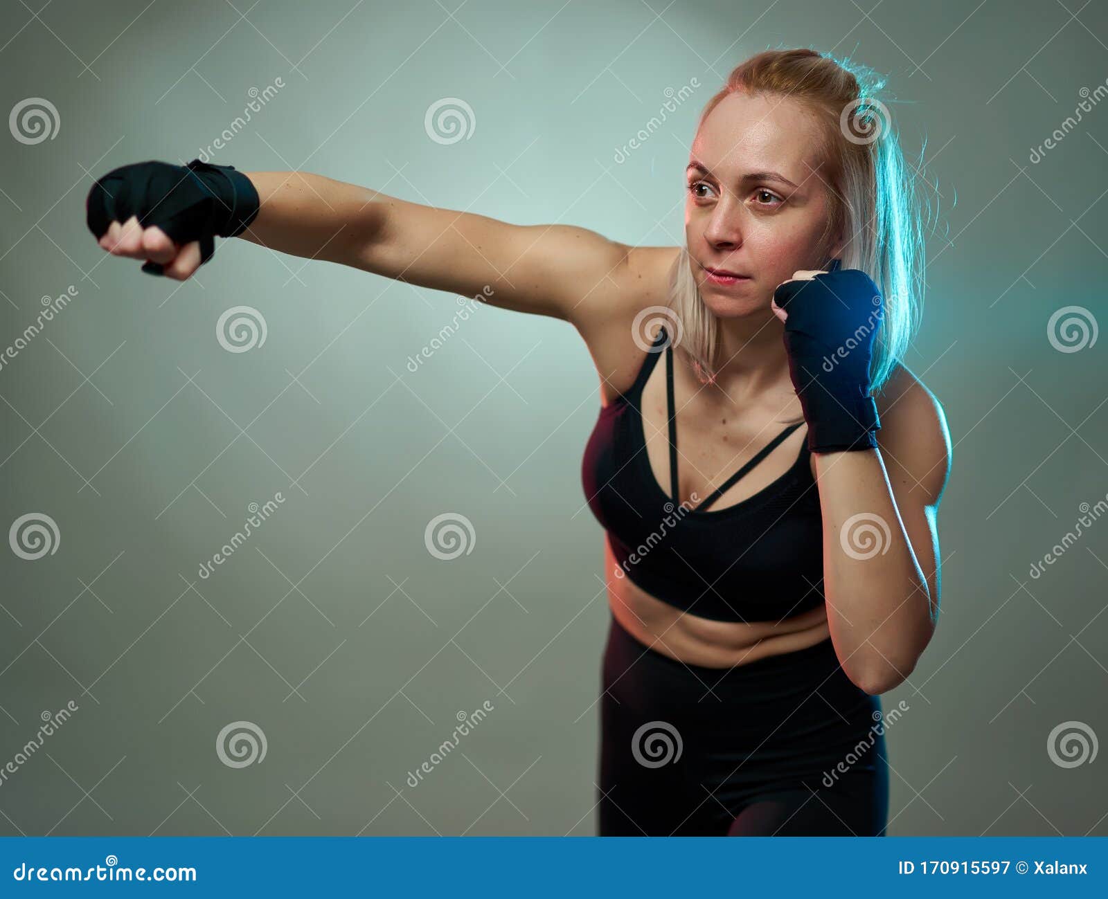 Woman doing shadow boxing stock image. Image of attractive - 170915597