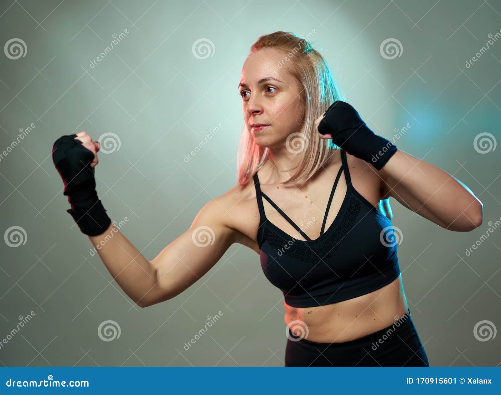 Woman doing shadow boxing stock image. Image of body - 170915601