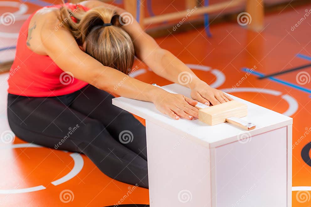 Woman Doing Sit and Reach Flexibility Test Stock Image - Image of reach ...