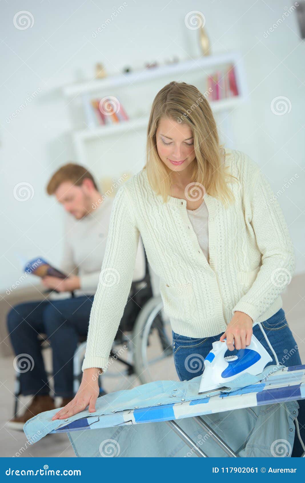 Woman doing some ironing stock image. Image of communication - 117902061