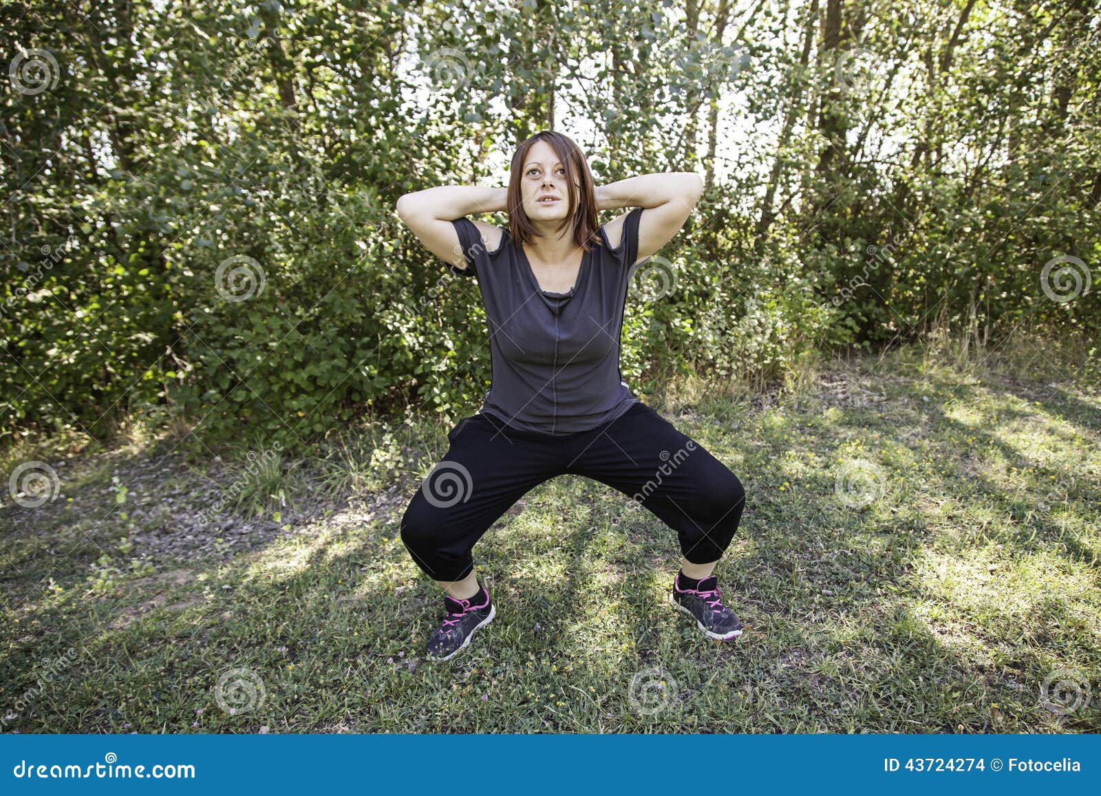 Woman doing squats stock photo. Image of autumn, nature - 43724274