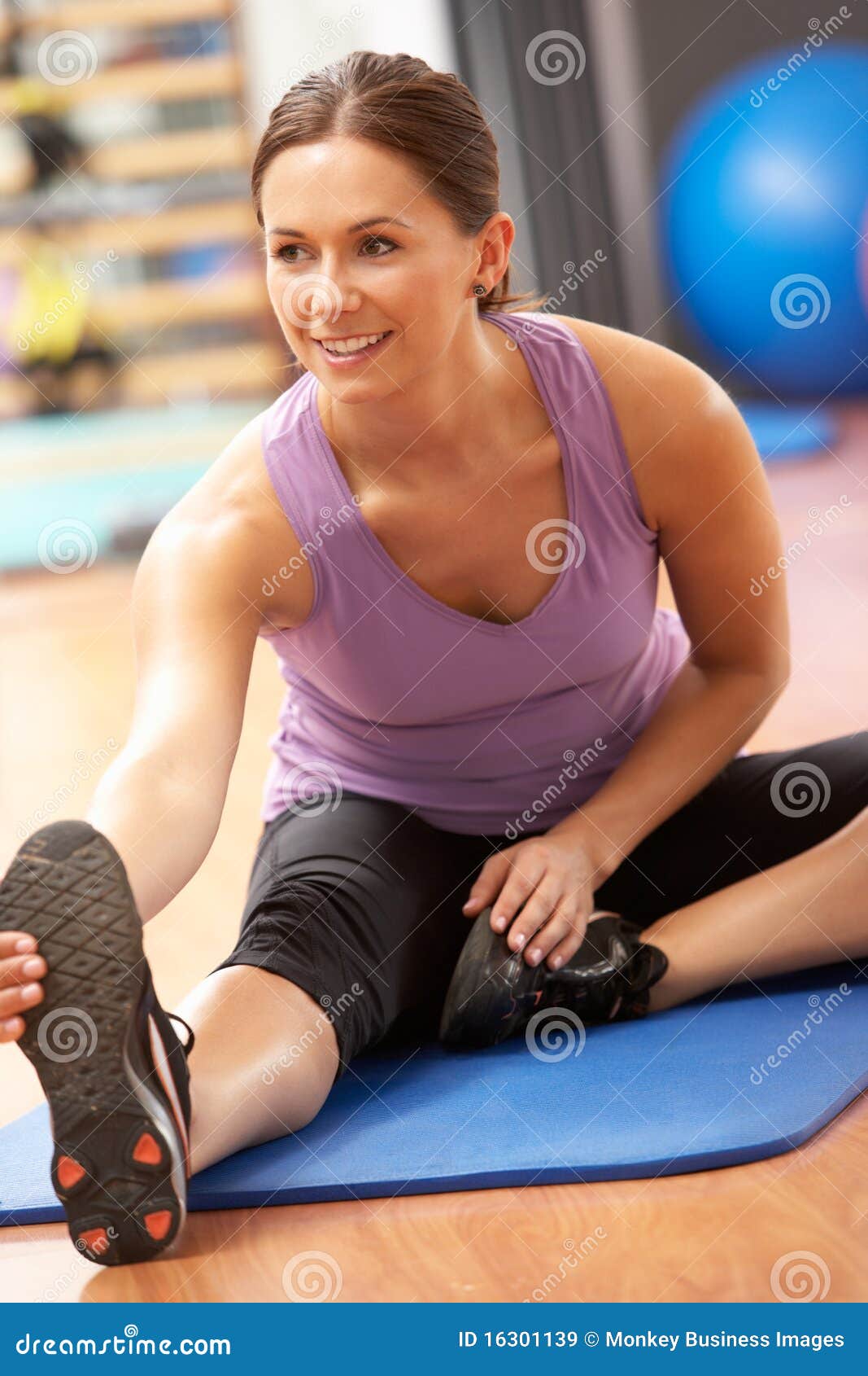 Woman Doing Stretching Exercises Stock Image - Image of active, class ...