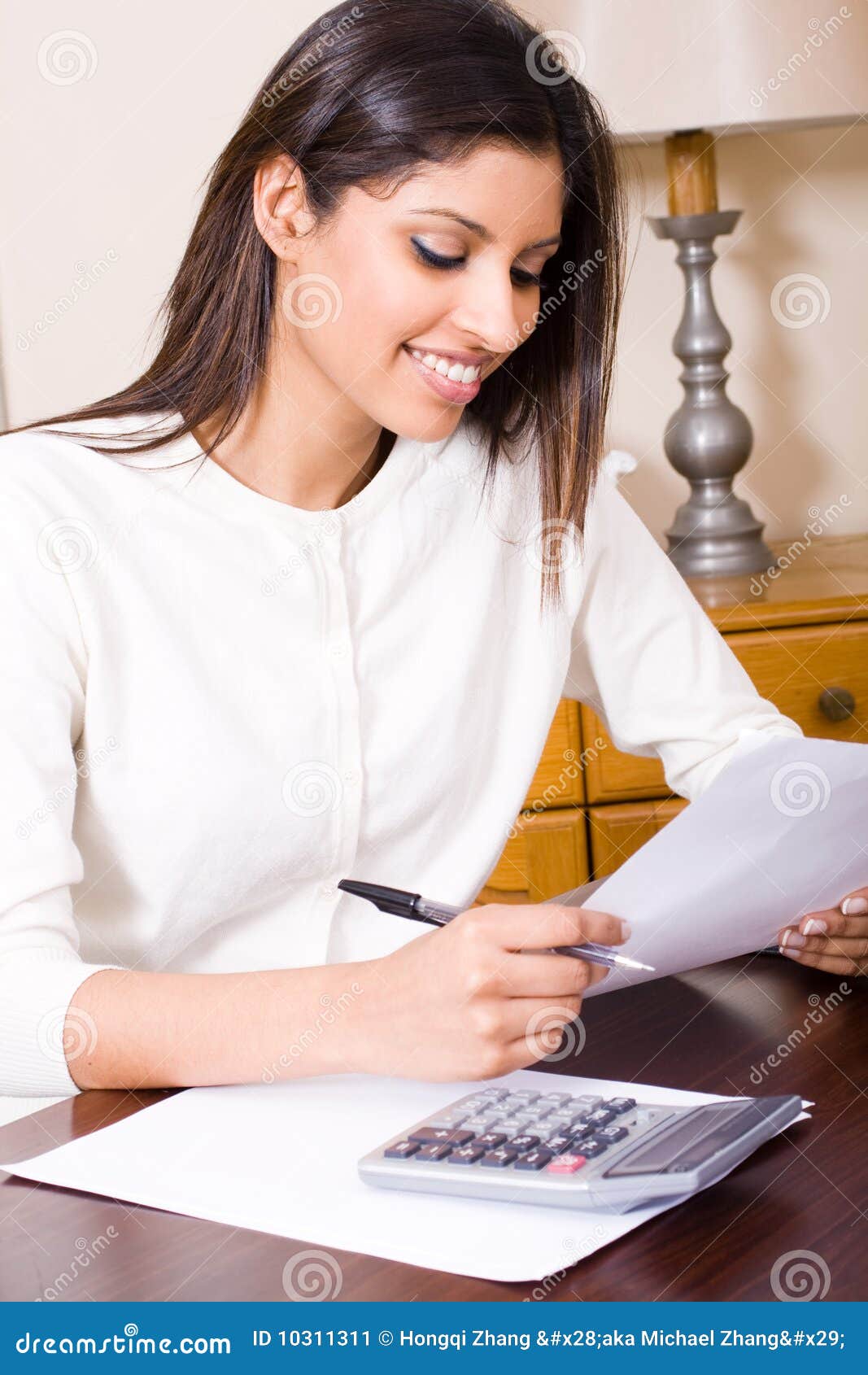 Woman doing taxes stock image. Image of credit, attractive - 10311311