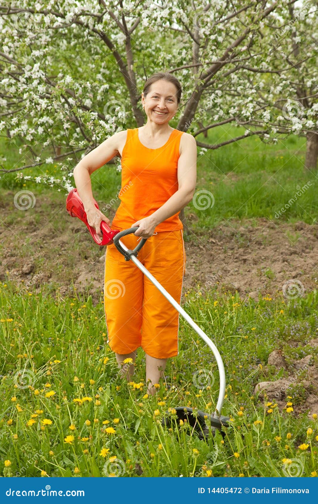 Woman Doing Work in Her Garden with Grass-mower Stock Photo - Image of ...