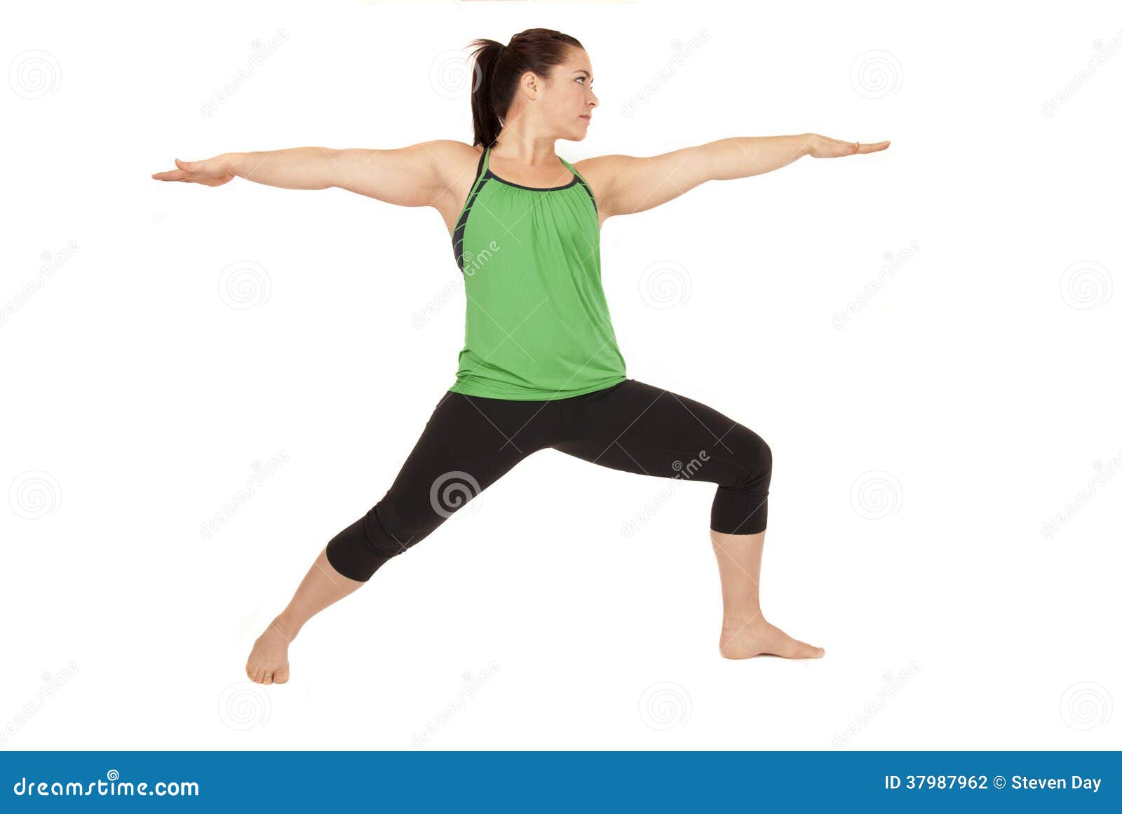 Woman Doing Yoga Pose Called Warrior 2 Arms Out Stock Photo - Image of ...