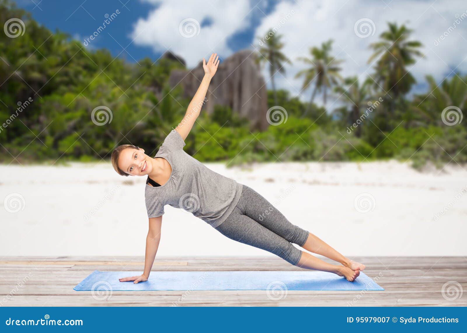 Woman Doing Yoga In Side Plank Pose On Beach Stock Image Image Of