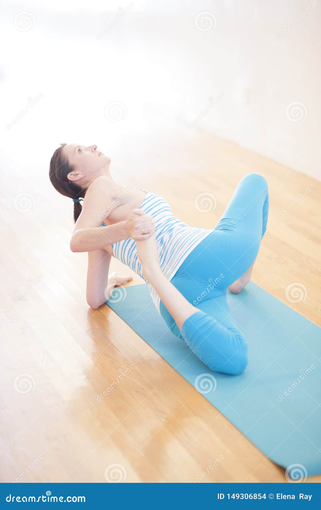 Woman Practicing Poses in a Yoga Studio Stock Photo - Image of practice ...