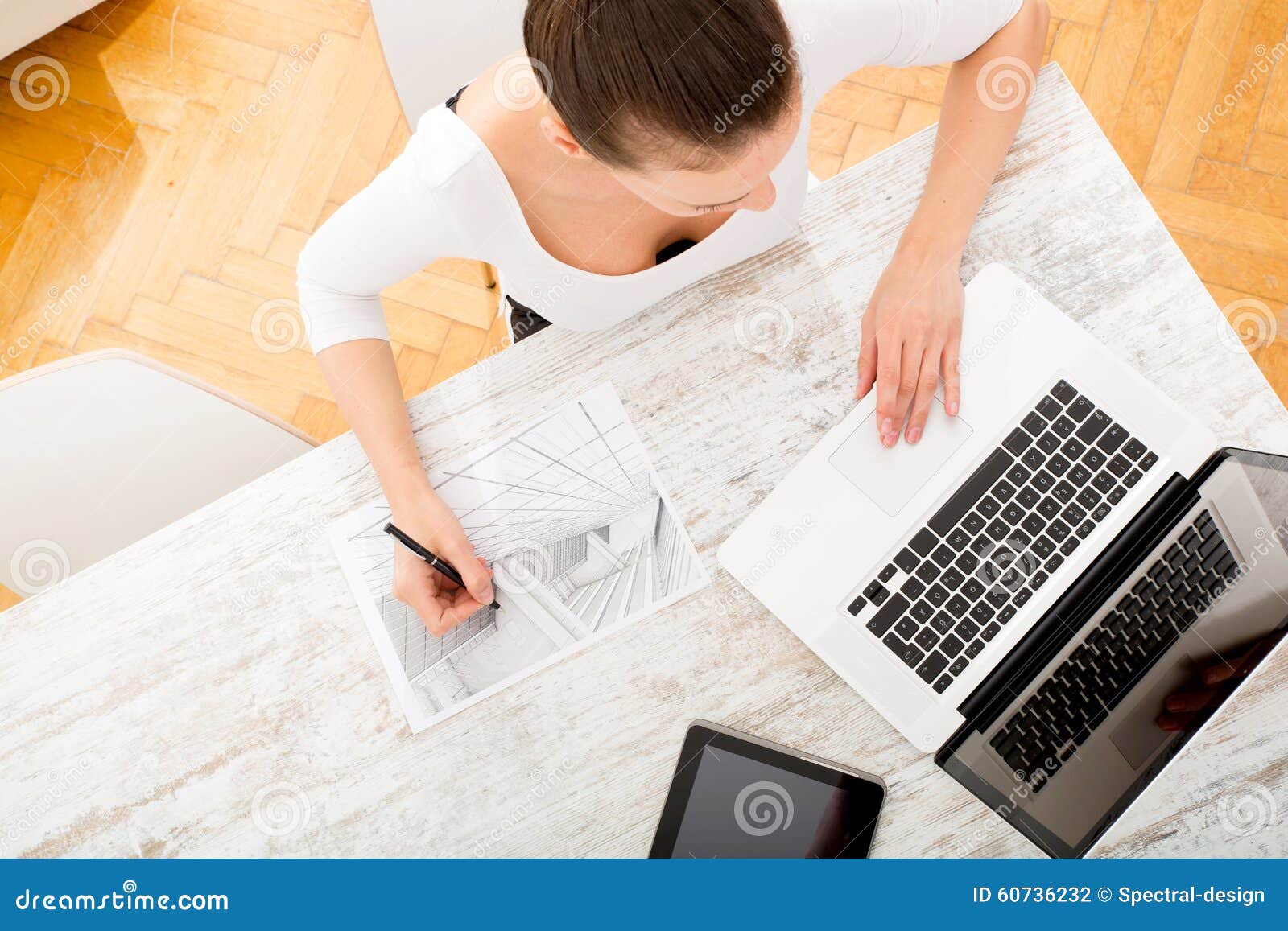 Woman drawing a blueprint stock photo. Image of bright - 60736232