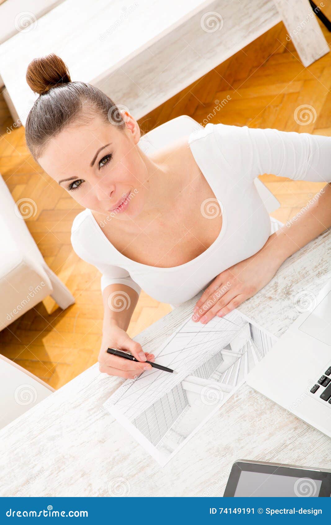Woman drawing a blueprint stock image. Image of engineer - 74149191