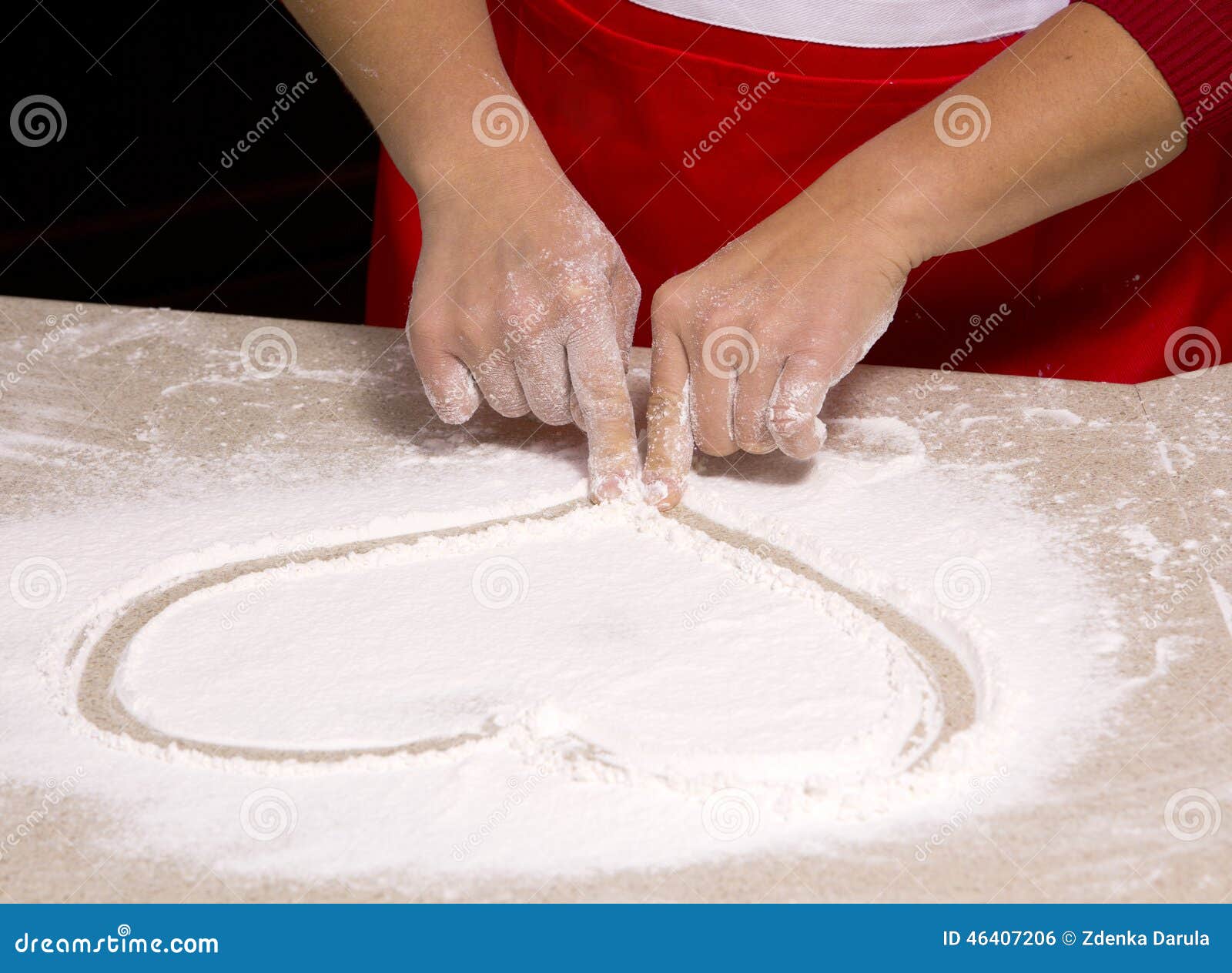 Woman drawing into flour stock photo. Image of glee, house - 46407206